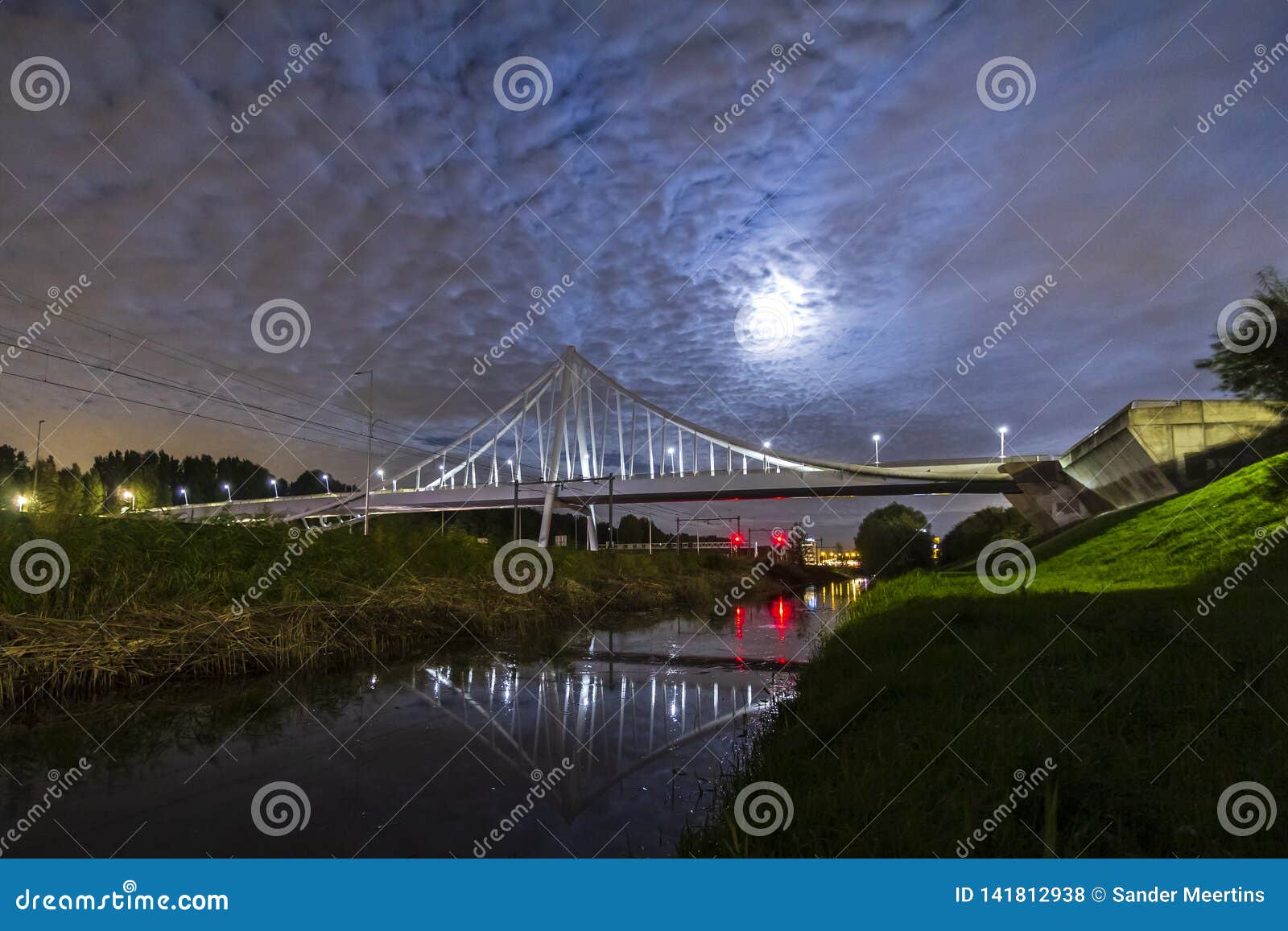 Suspension Bridge at Night Under Moonlight, Reflection in Water Stock ...