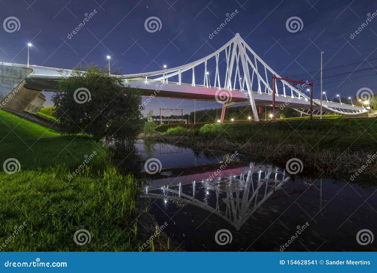 Suspension Bridge at Night Under Moonlight, Reflection in Water Stock ...