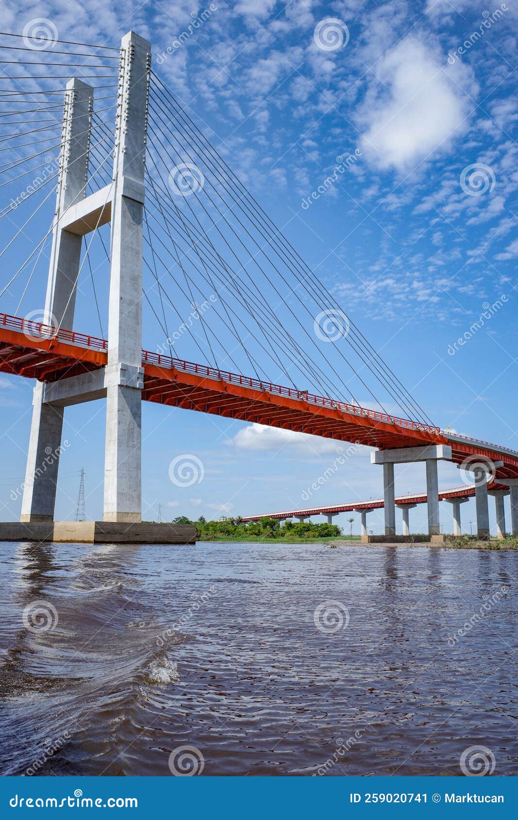 A Suspension Bridge Spanning the Amazon River Near Iquitos, Peru Stock ...