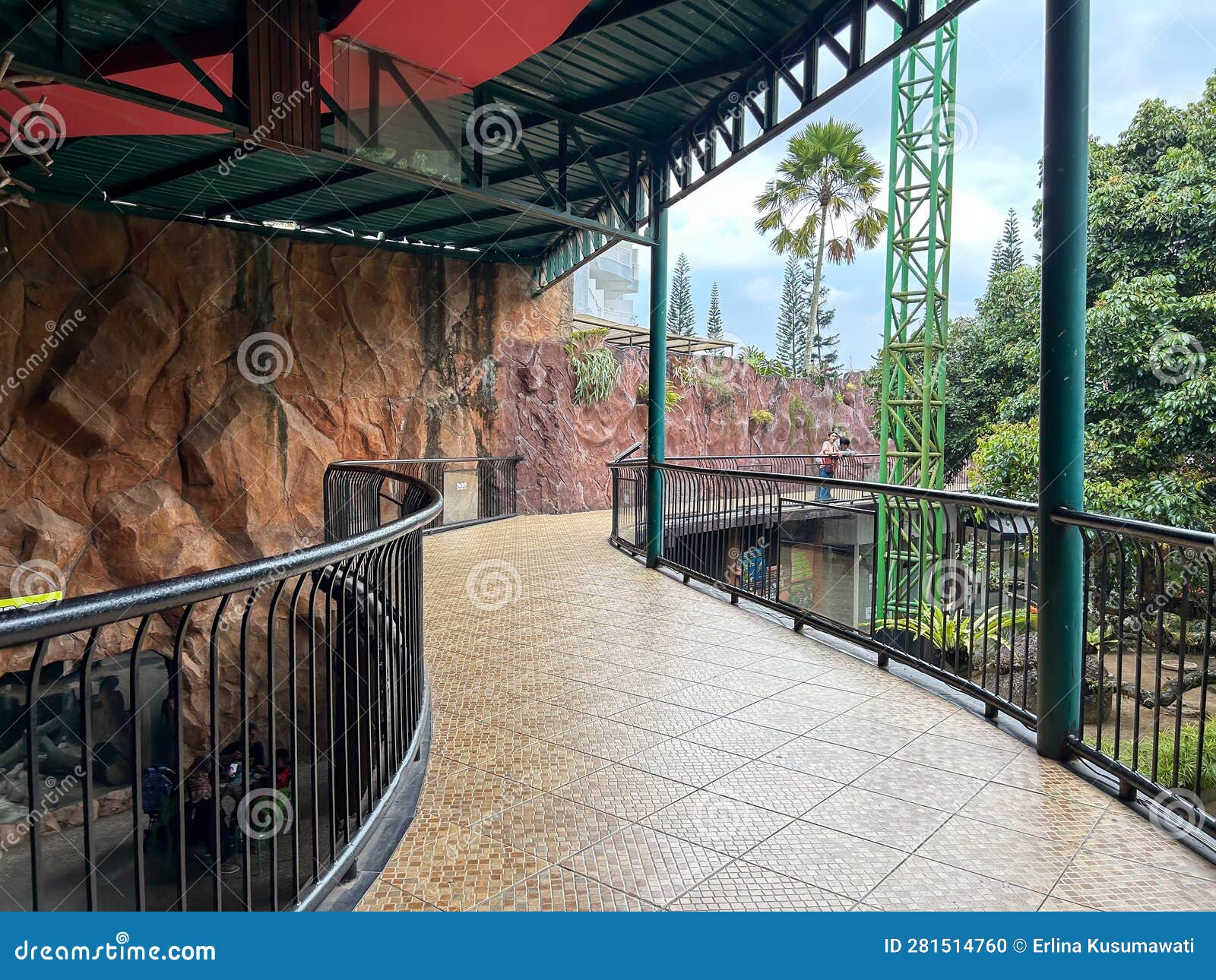A Suspension Bridge in a Zoo with a Waterfall beside it Stock Photo ...