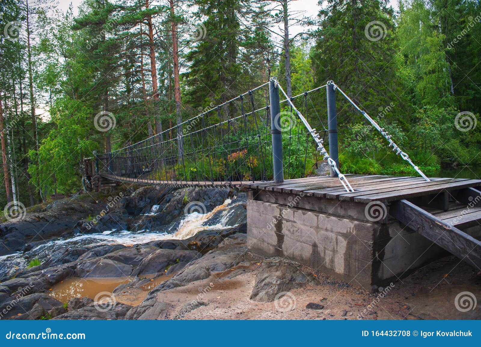 Suspension Cable Bridge Crossing the River Stock Photo - Image of ...