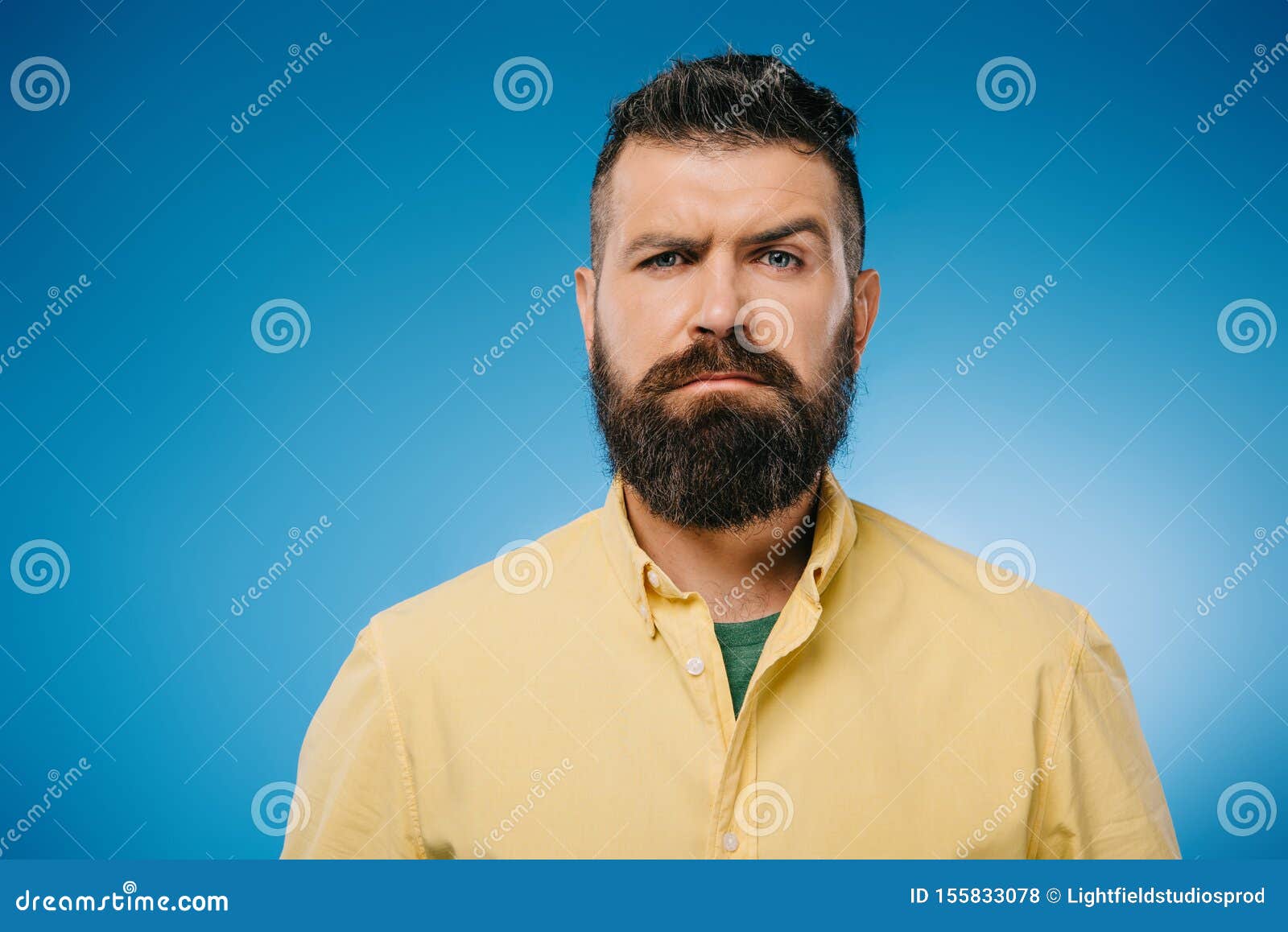Suspicious Handsome Man Looking at Camera Isolated Stock Photo - Image ...