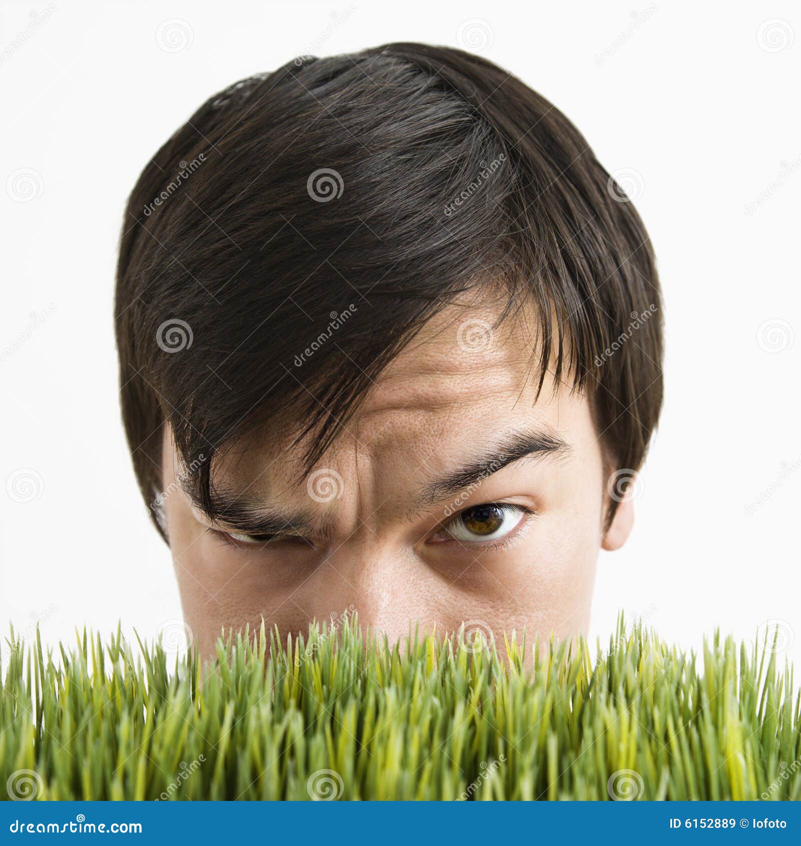 Suspicious Man Behind Grass. Stock Image - Image of multiethnic ...
