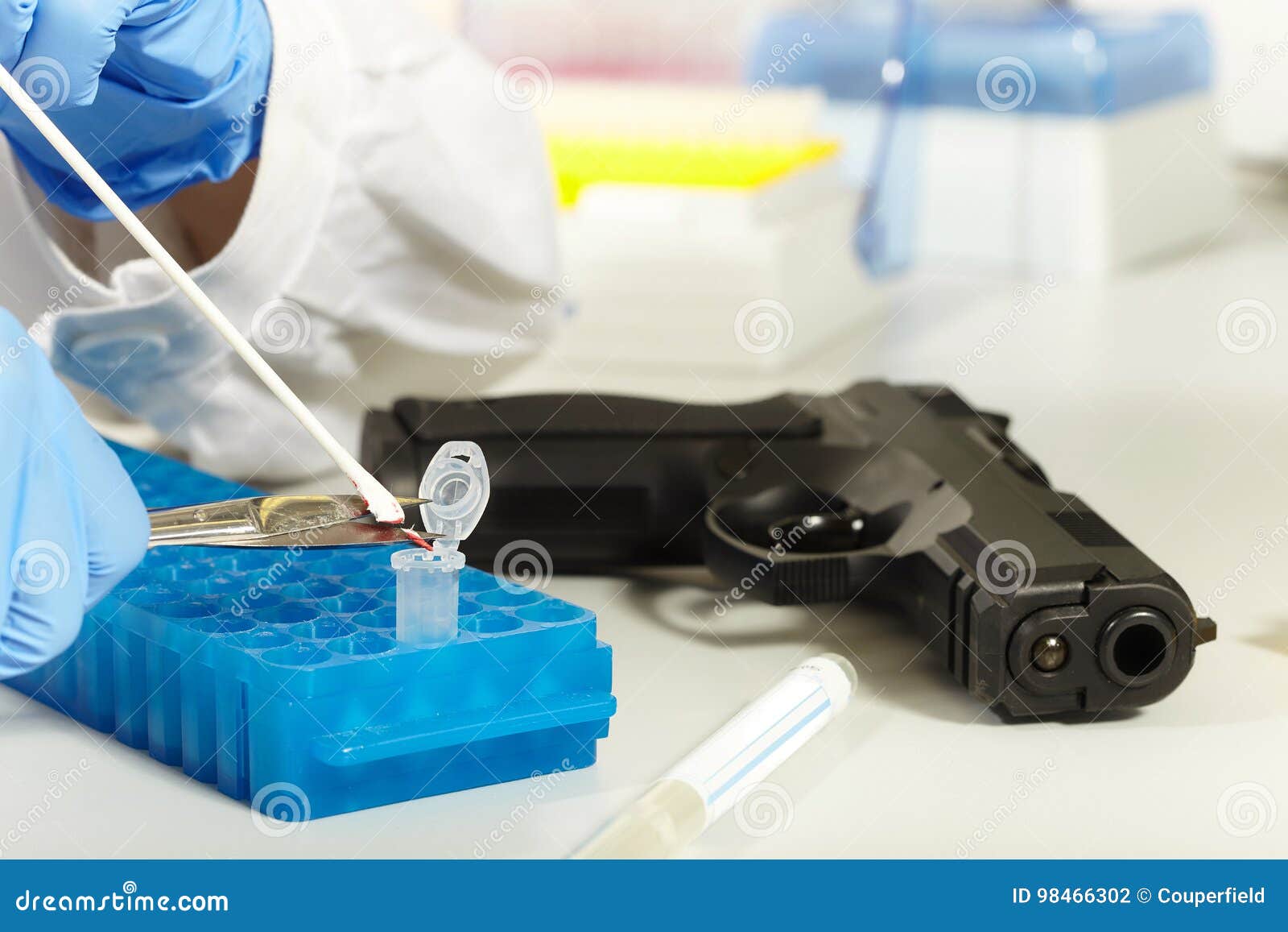Swabbing Sample of DNA from Handgun Stock Photo - Image of ...