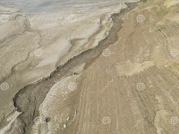 Swamp mud with dry river stock image. Image of reservoir - 255614645