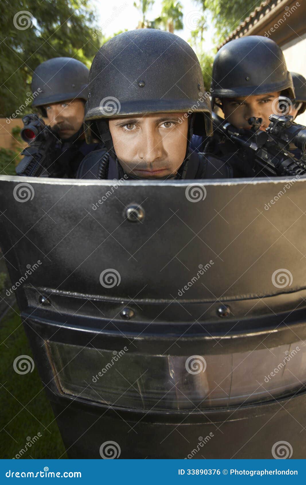 Swat Officers Behind Shield Stock Photo - Image of coworker, outdoors ...