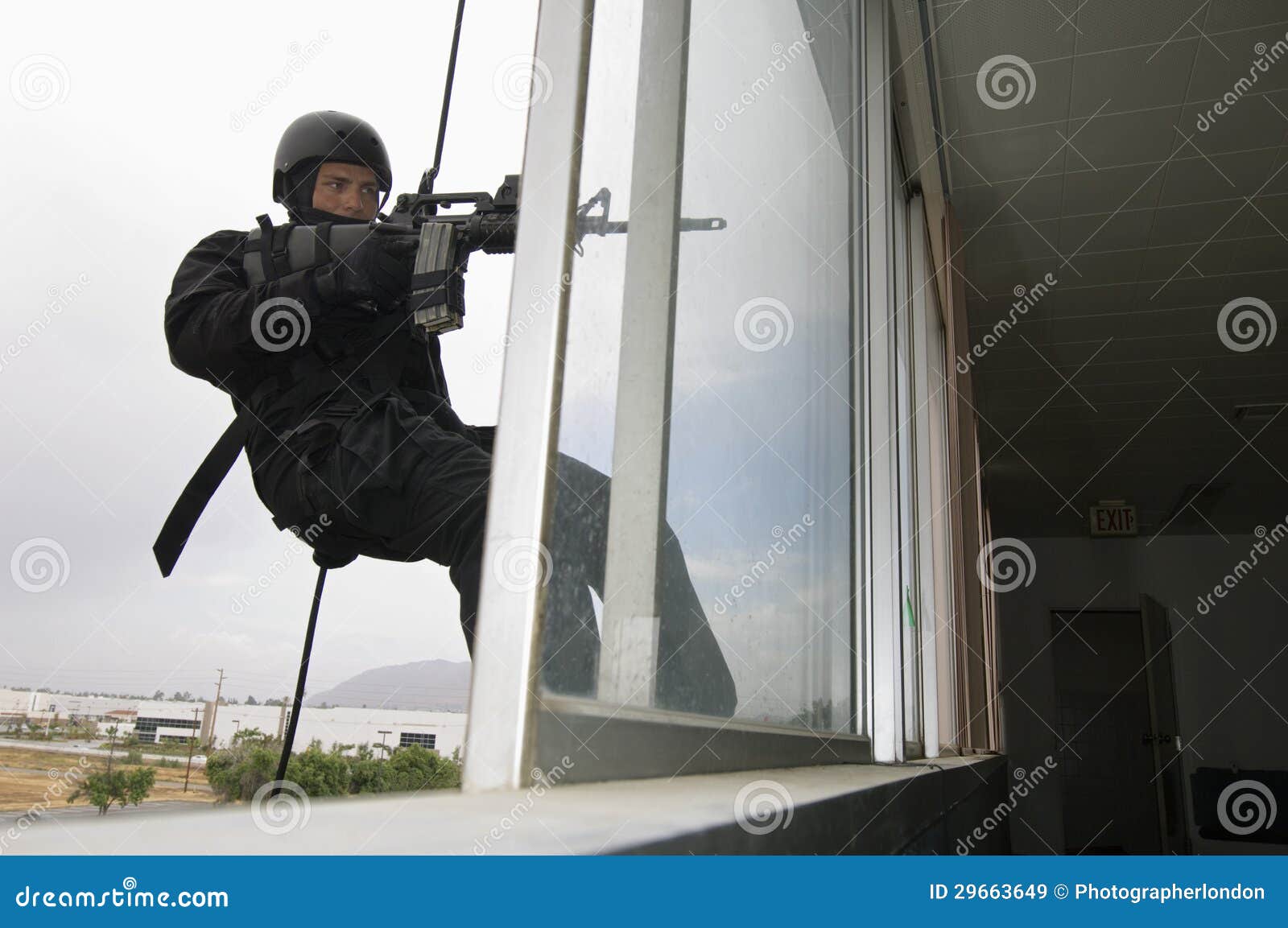 Swat Team Officer Rappelling Aiming Gun Photos - Free & Royalty-Free ...
