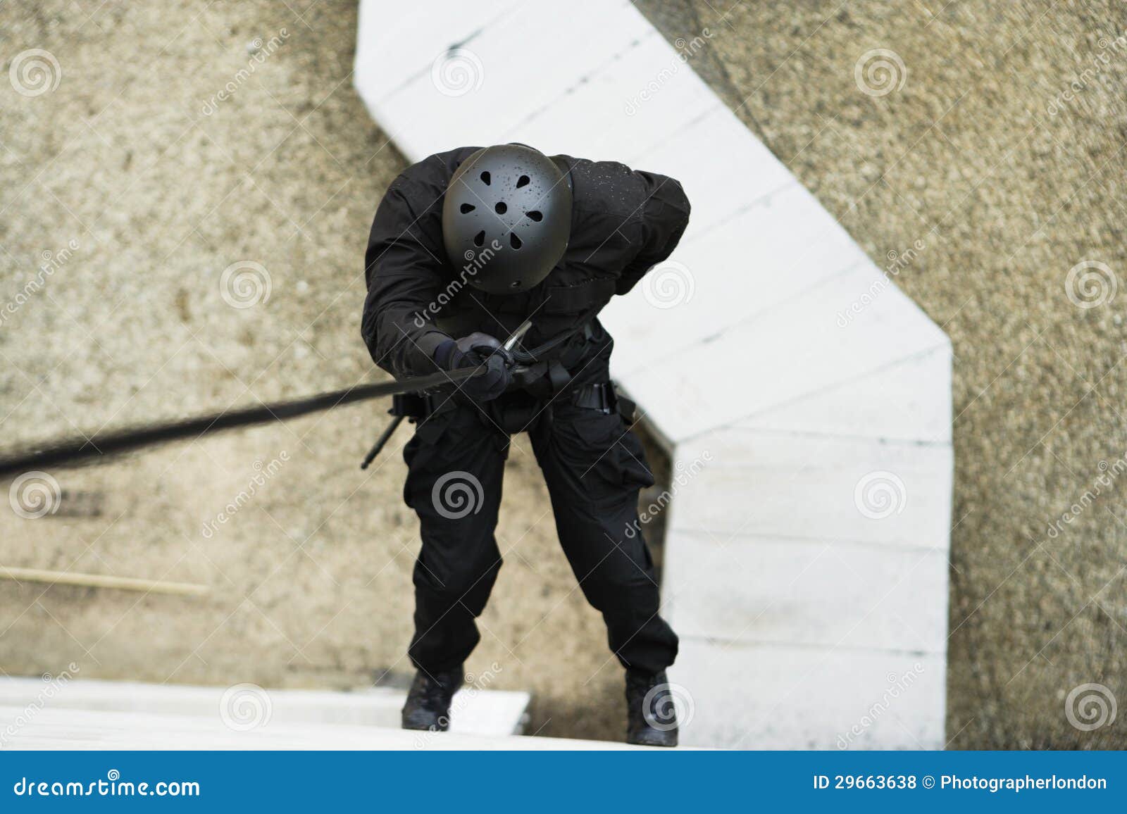 SWAT Team Officer Rappelling from Building Stock Photo - Image of ...