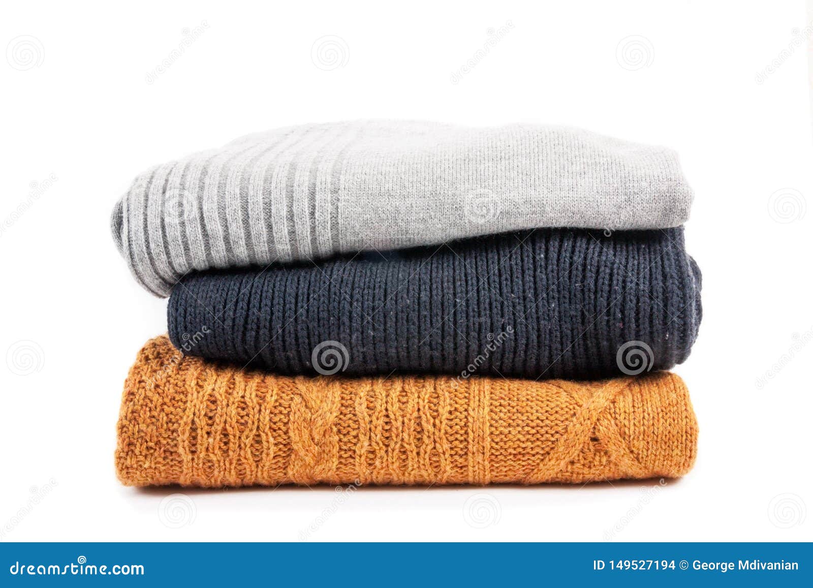 Sweaters in the stack stock photo. Image of knit, stack - 149527194