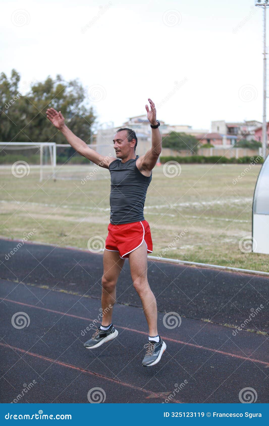 Sweating Athlete Doing Jumping Jacks Stock Image - Image of physical ...