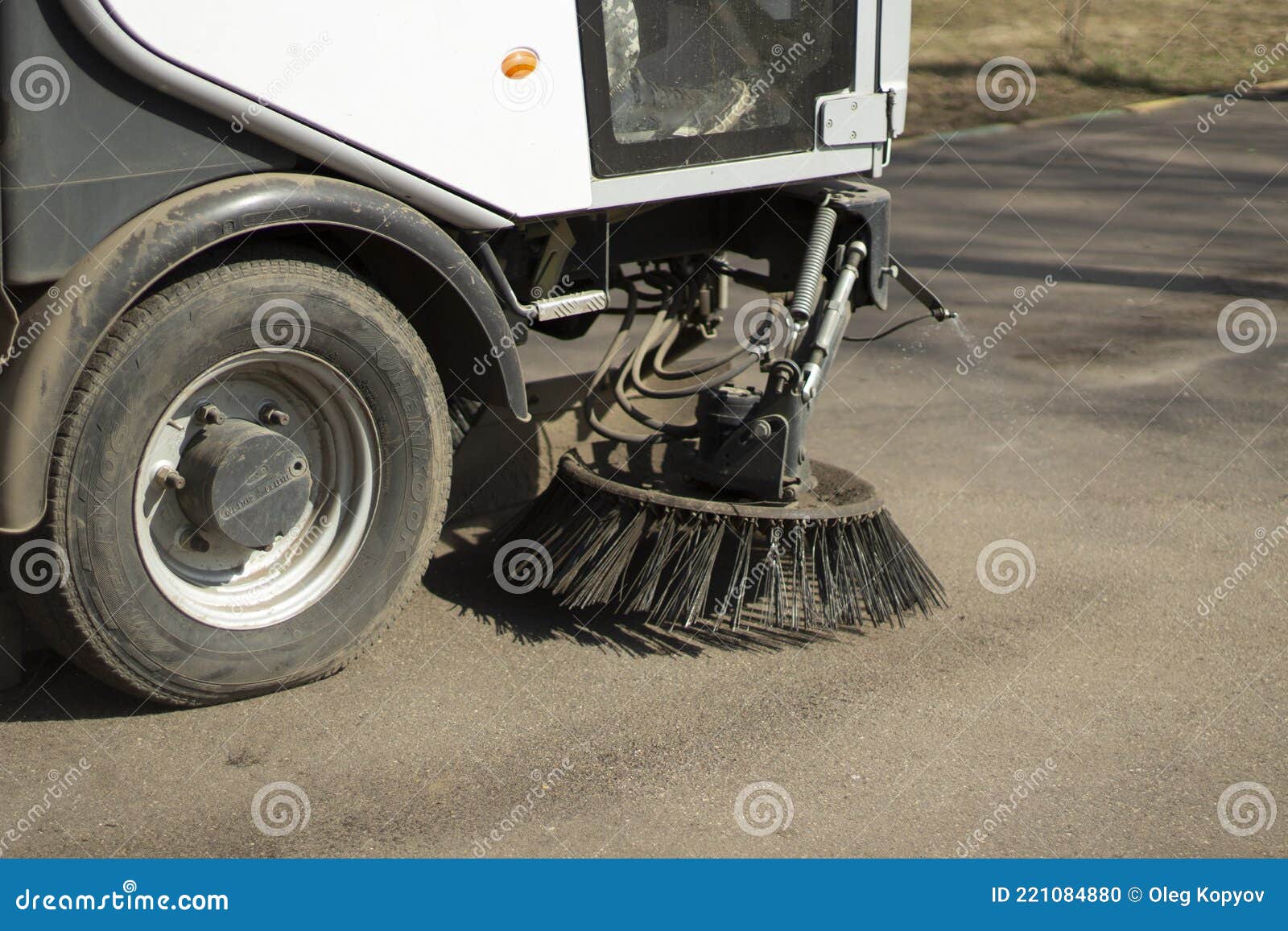 The Sweeper is Sweeping the Asphalt. Cleaning the Path with a Cleaning ...