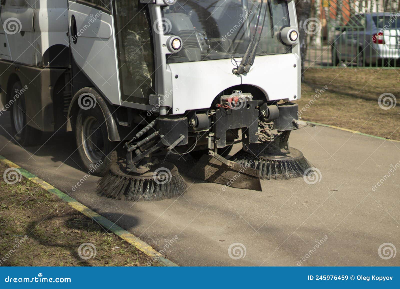 The Sweeper is Sweeping the Asphalt. Cleaning the Path with a Cleaning ...
