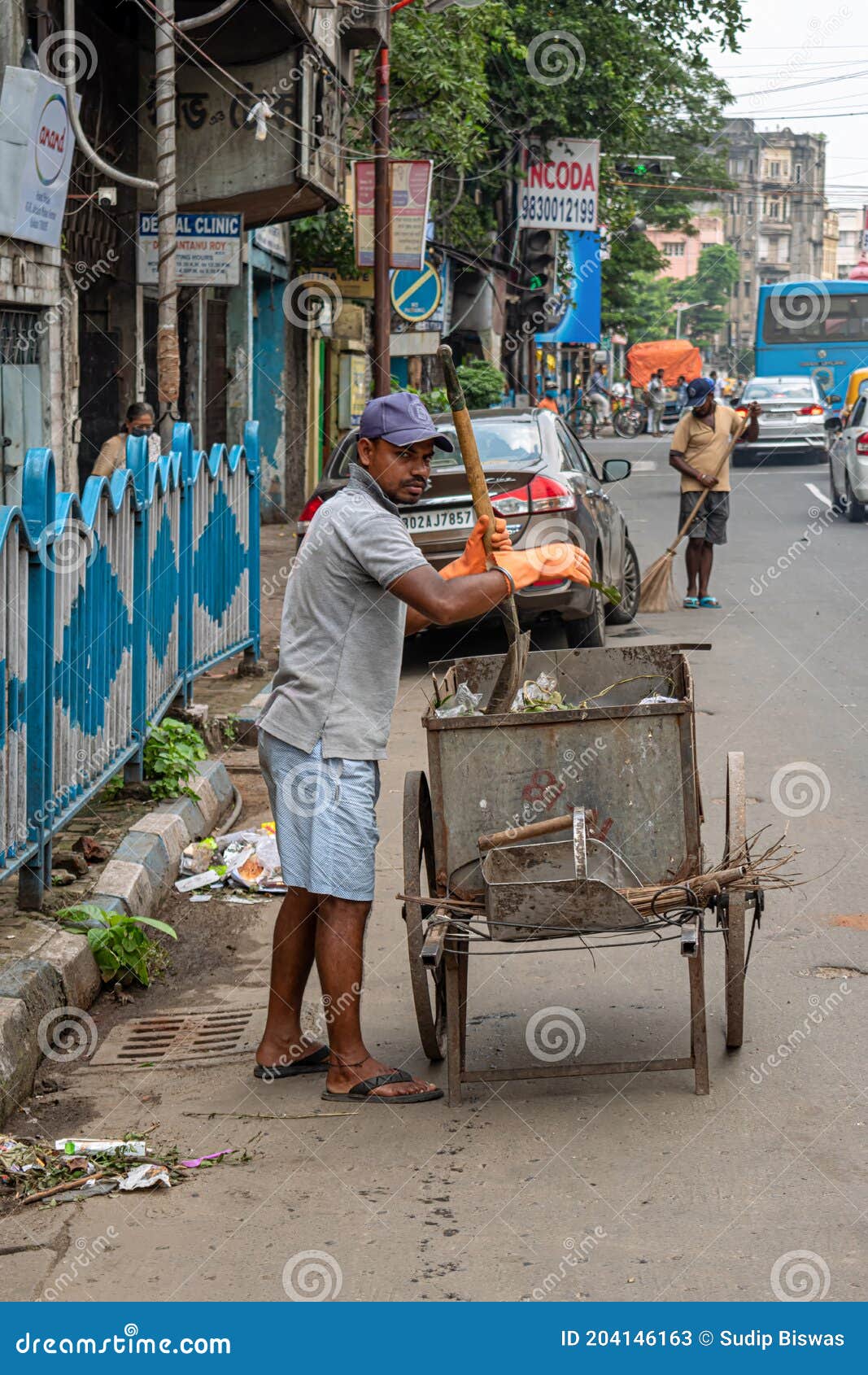 A Sweeper Sweeps the Street of Kolkata, India on October 2020 Editorial ...