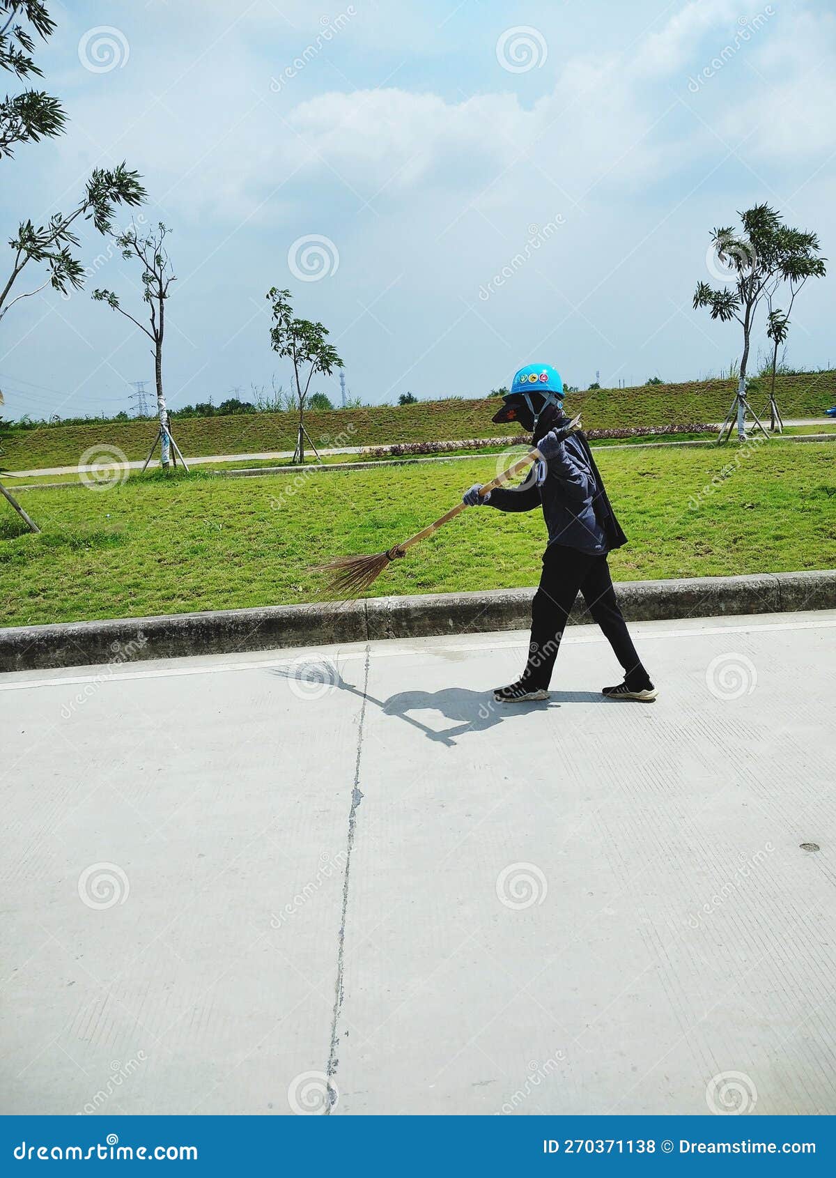 Sweeper Worker in the road stock photo. Image of people - 270371138