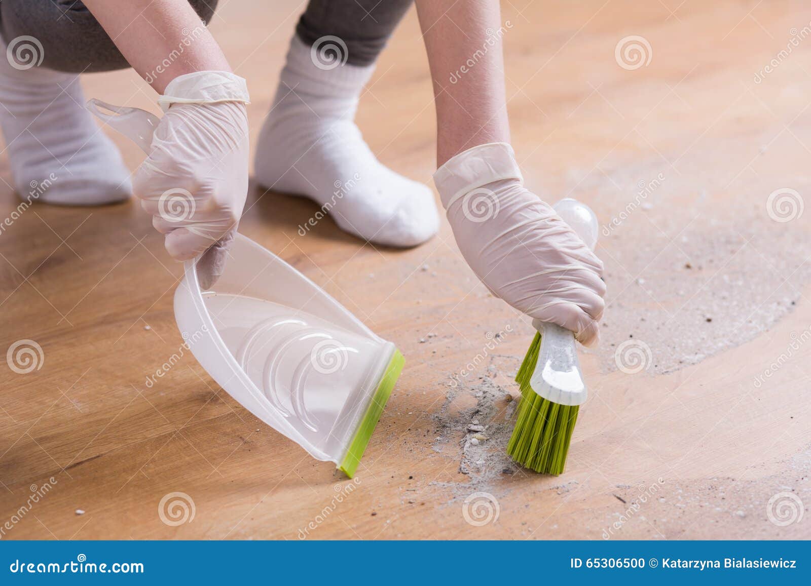 Sweeping the dust stock photo. Image of occupation, house - 65306500