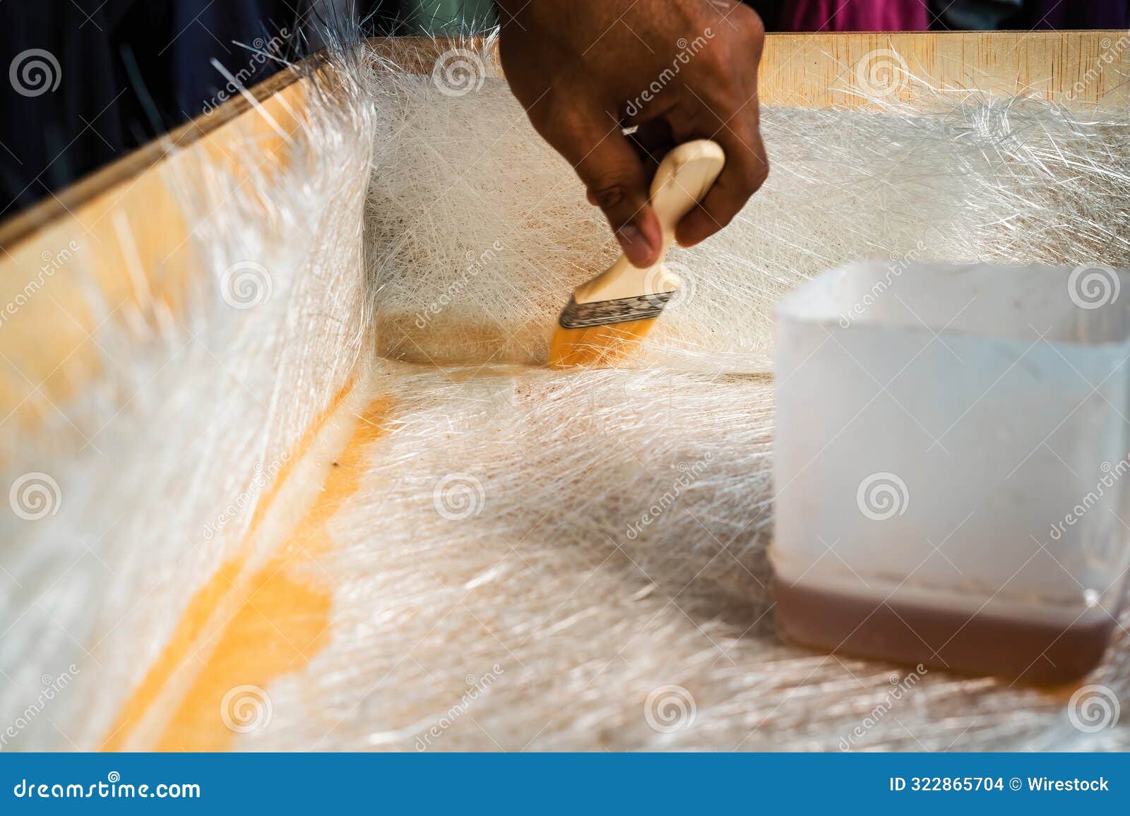 Sweeping a Solution Across Fiberglass Panels within a Wooden Container ...