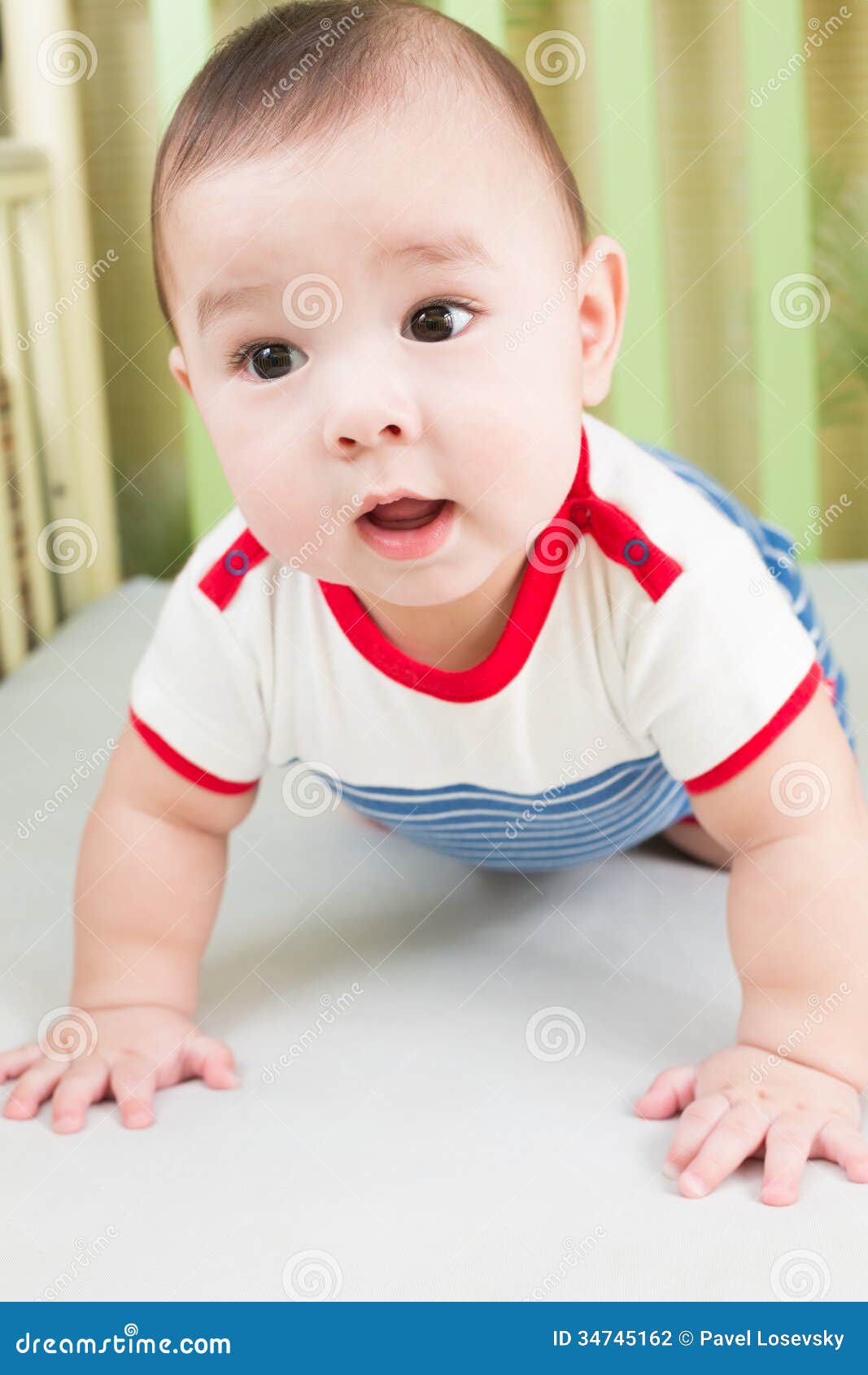 Sweet Baby Boy in Striped Clothes Stock Photo - Image of dressed, hand ...