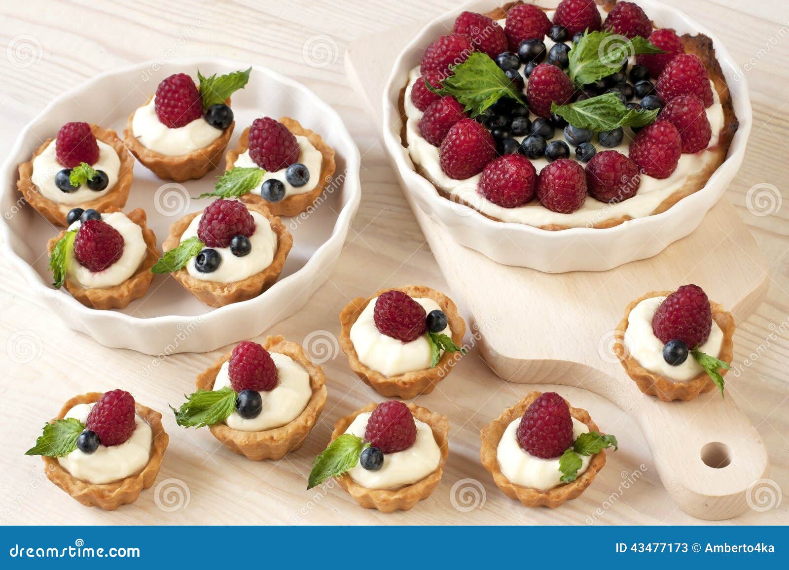 Sweet Baskets with Cream and Raspberries and Blueberry Stock Image ...
