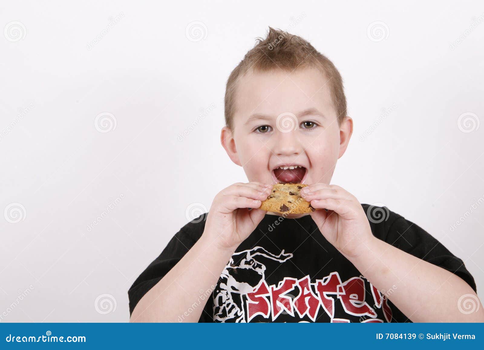 Sweet boy eating food stock image. Image of eating, sweets - 7084139
