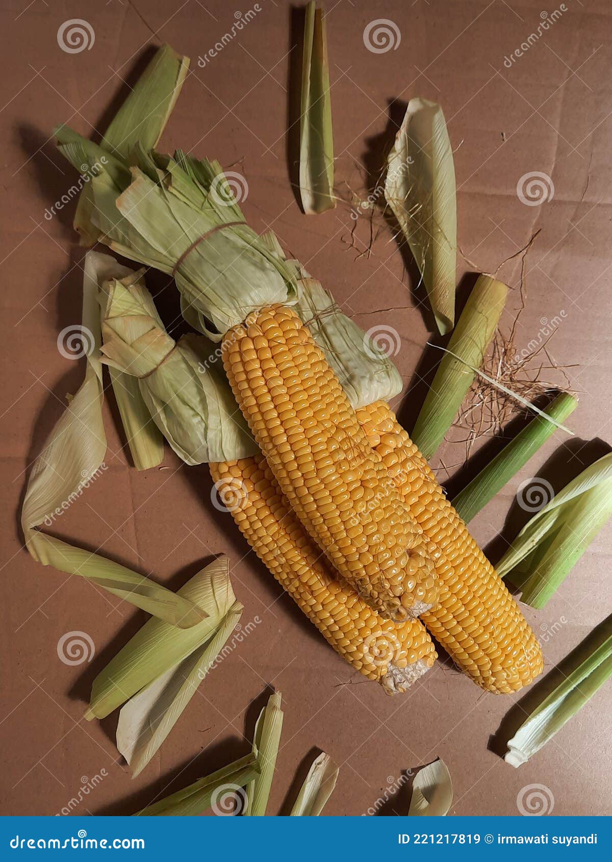 Sweet corn on cardboard stock image. Image of agriculture - 221217819