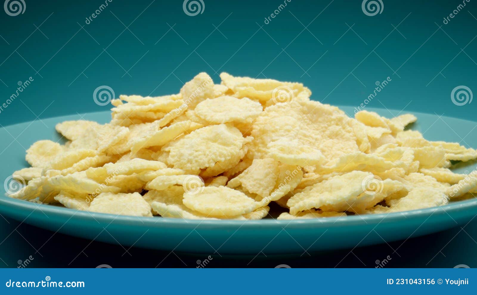 Sweet Corn Flakes on a Blue Dish, Close Up Stock Photo - Image of ...