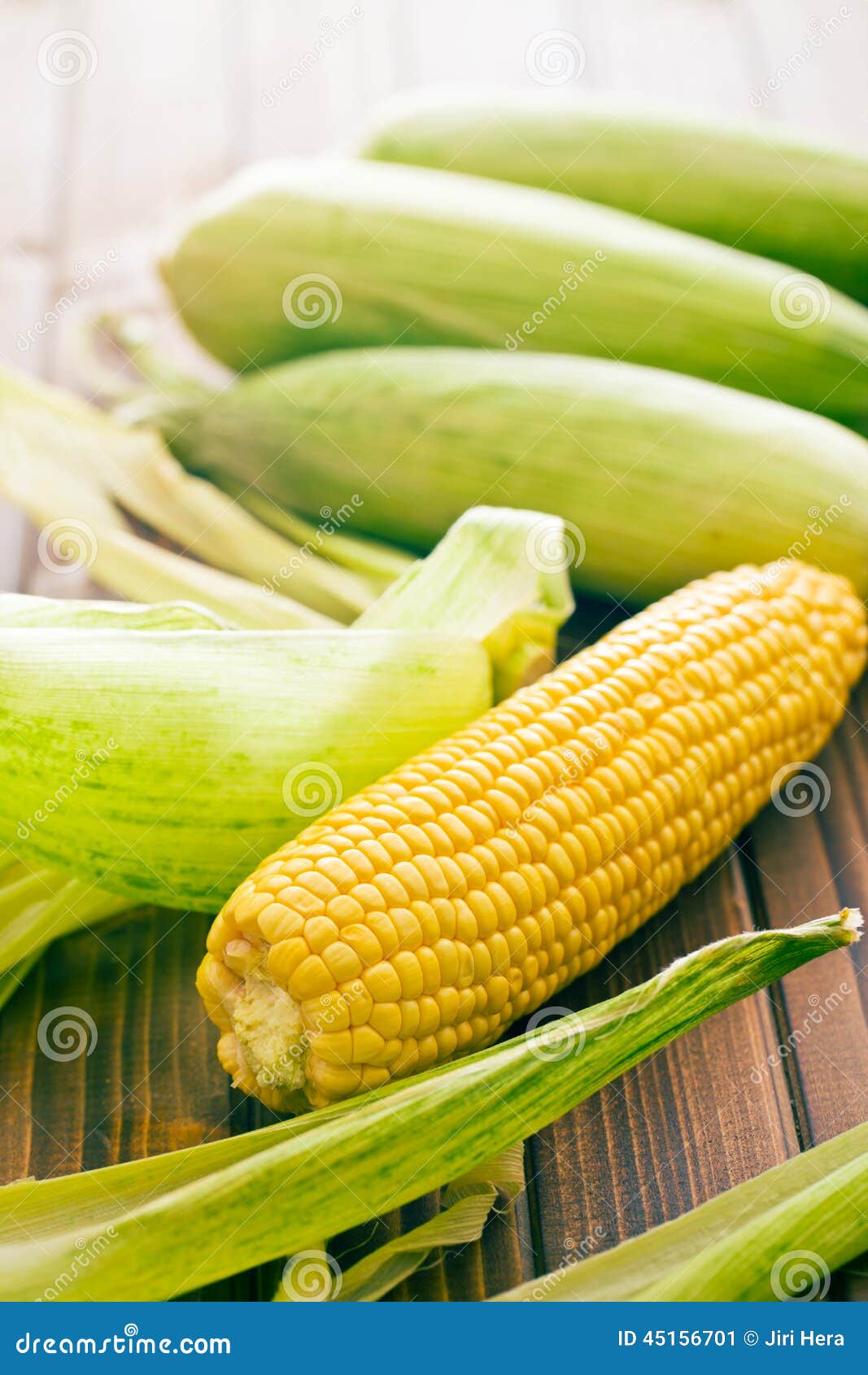 Sweet corn on wooden table stock image. Image of vegetables - 45156701