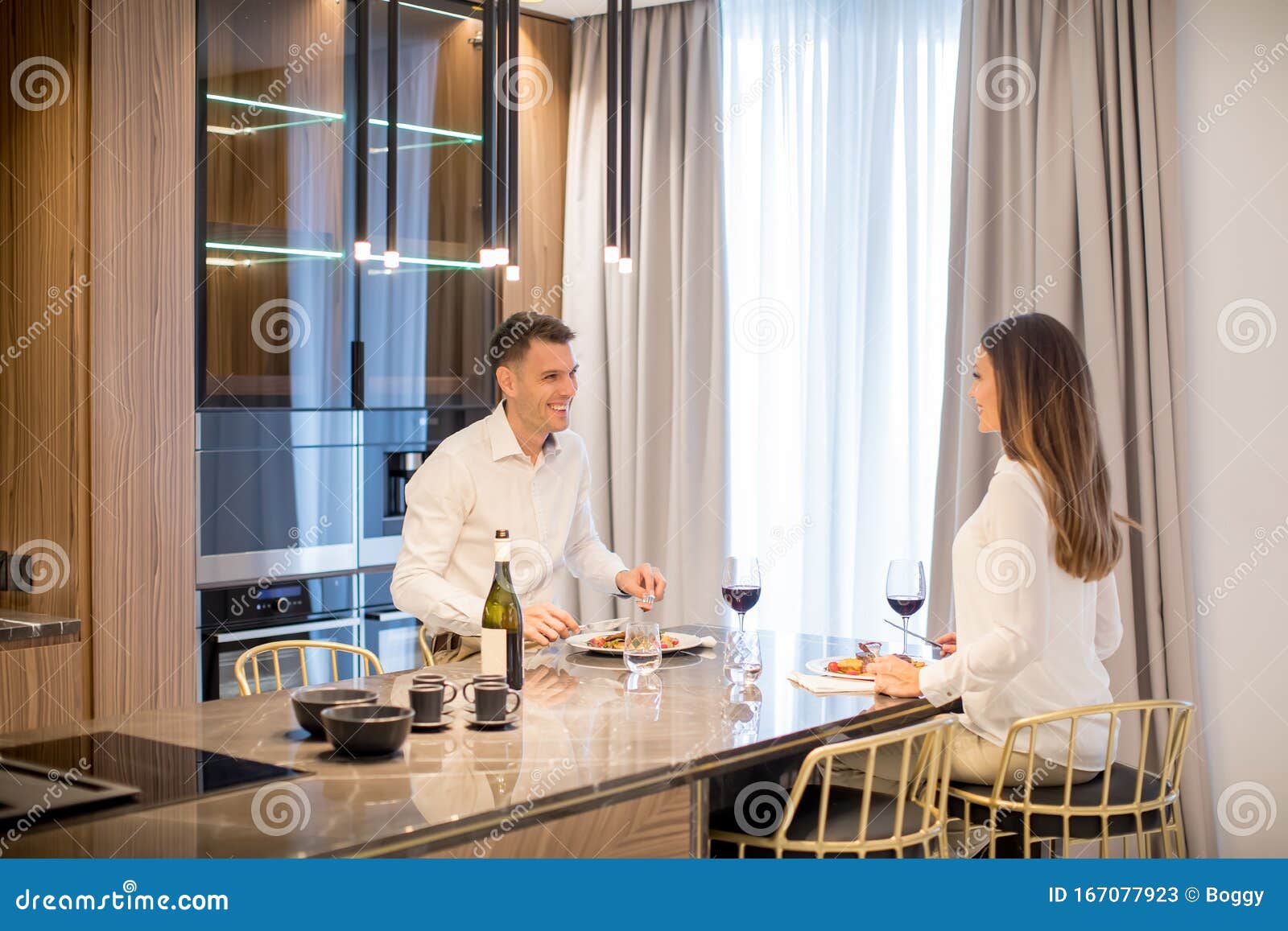 Sweet Couple Having a Romantic Dinner at Luxury Kitchen Stock Image ...