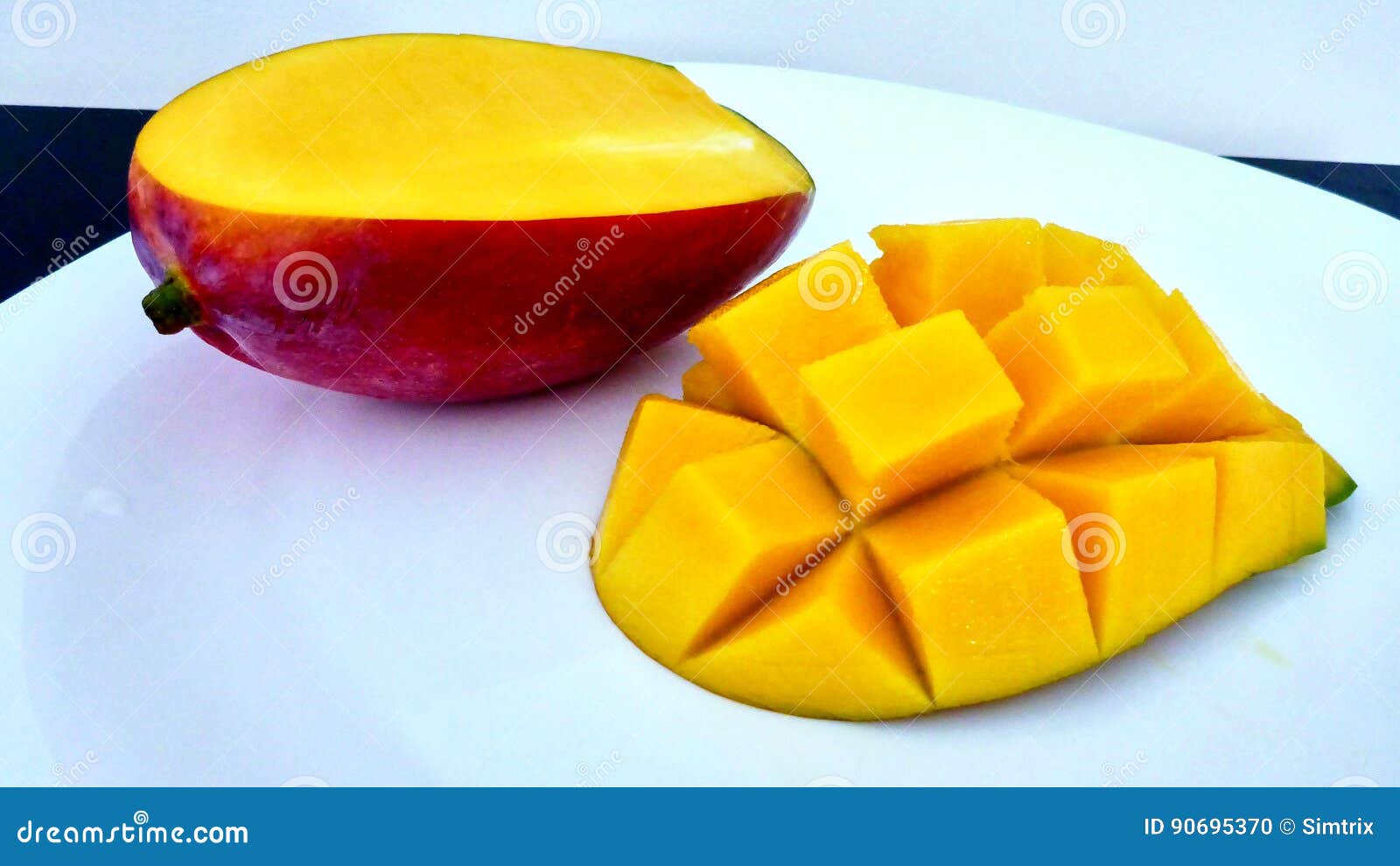 Sweet Cutted Mango on a Plate Stock Photo - Image of tasty, sweet: 90695370