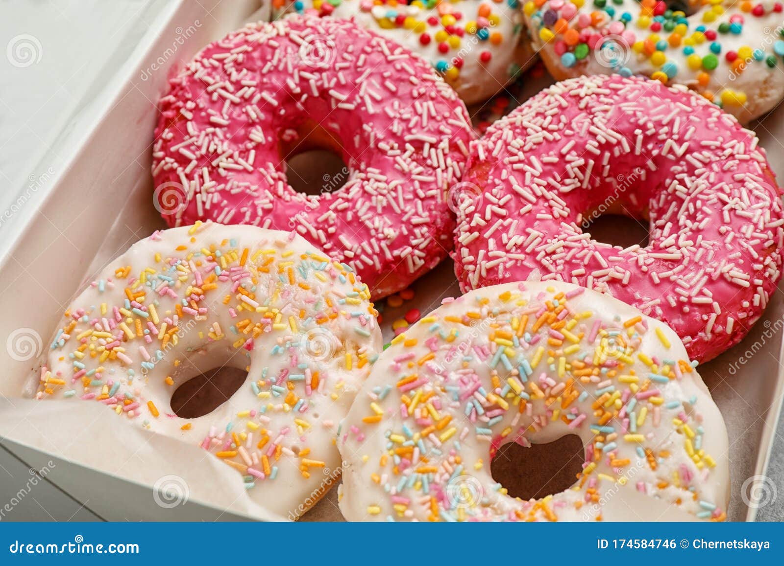 Sweet Delicious Glazed Donuts in Box, Closeup Stock Photo - Image of ...