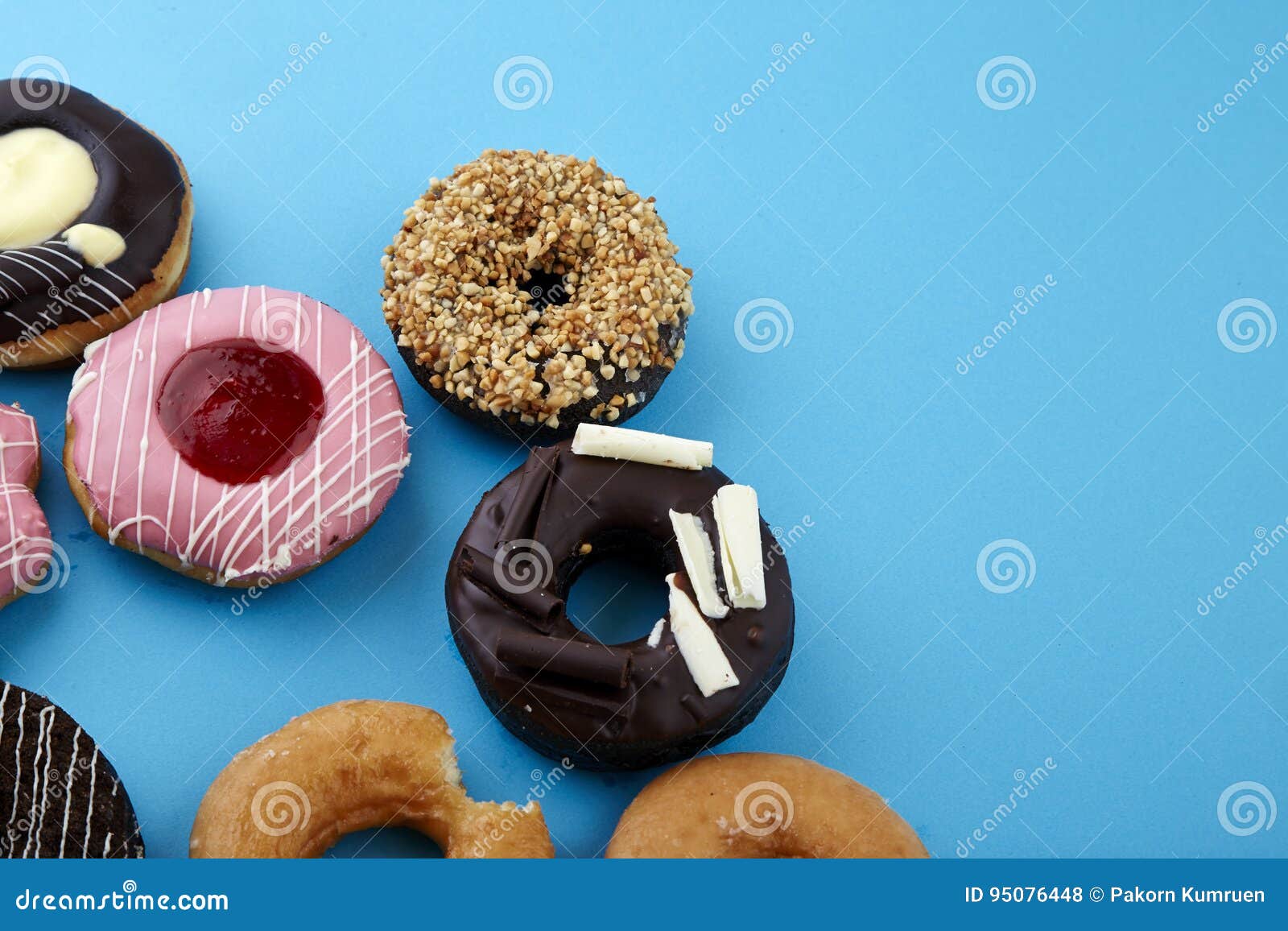 Sweet Donuts on the Blue Background Stock Photo - Image of colorful ...