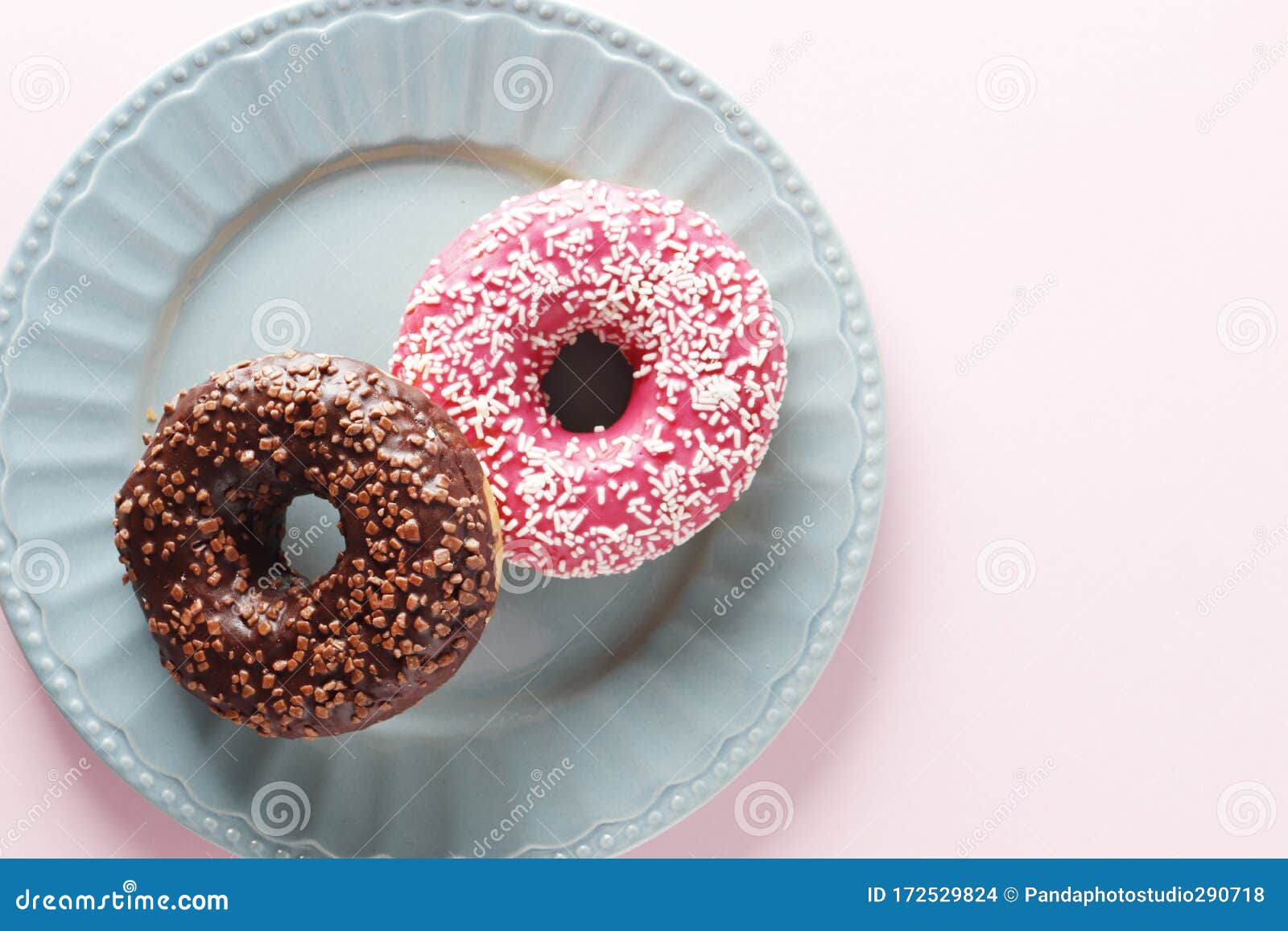 Sweet donuts on plate stock photo. Image of baked, donut - 172529824