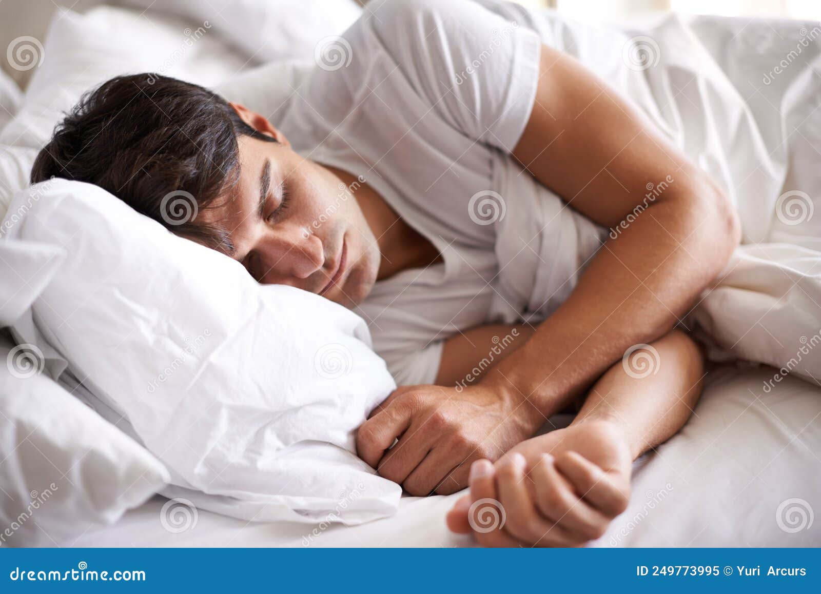 Sweet Dreams. Shot of a Young Man Sleeping in Bed. Stock Image - Image ...