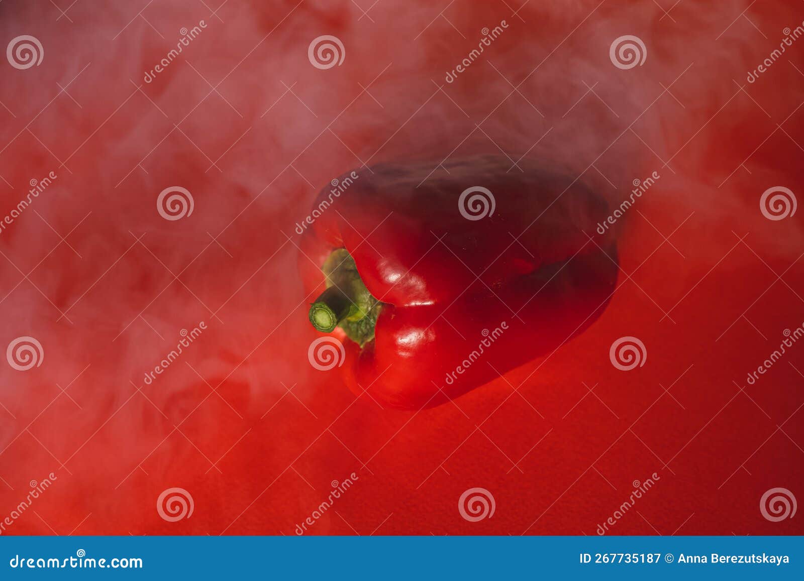 SWEET, Fresh RED PEPPER on a RED BACKGROUND with a LIGHT SMOKE Stock ...