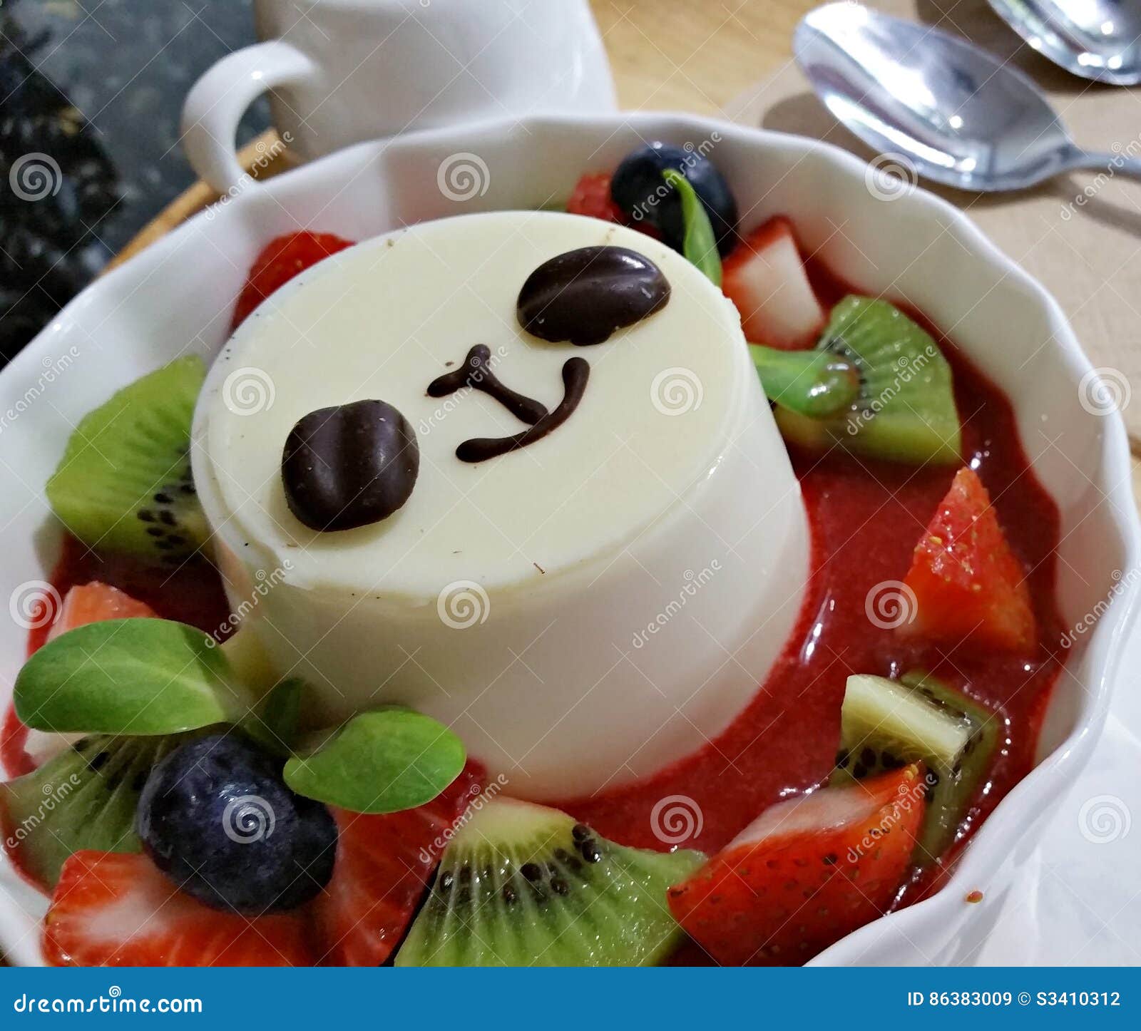 Sweet Fruity Syrup and the Panda Face Pudding. Stock Image - Image of flavor, dessert: 86383009