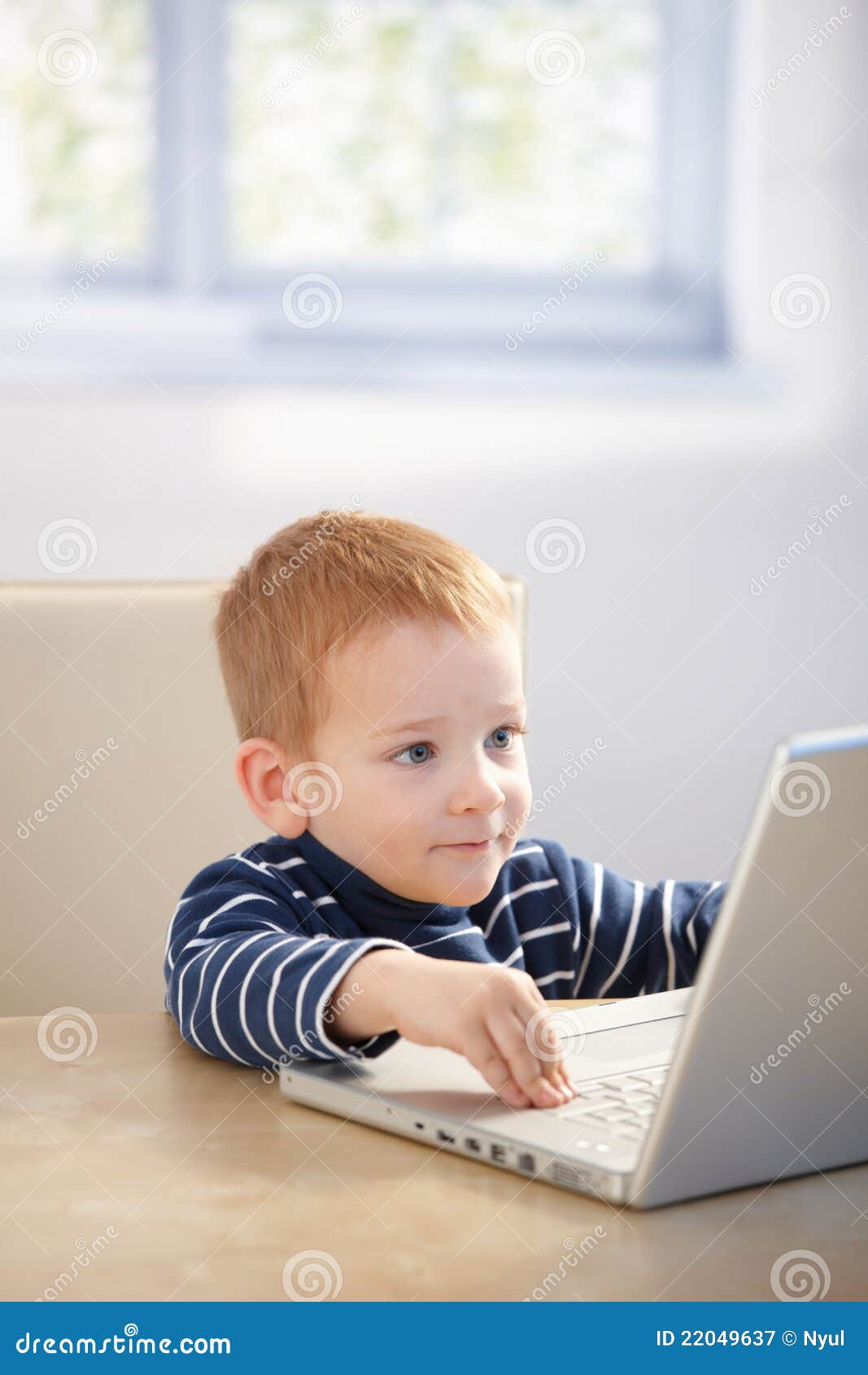 Sweet Gingerish Kid Playing Video Game on Laptop Stock Image - Image of ...
