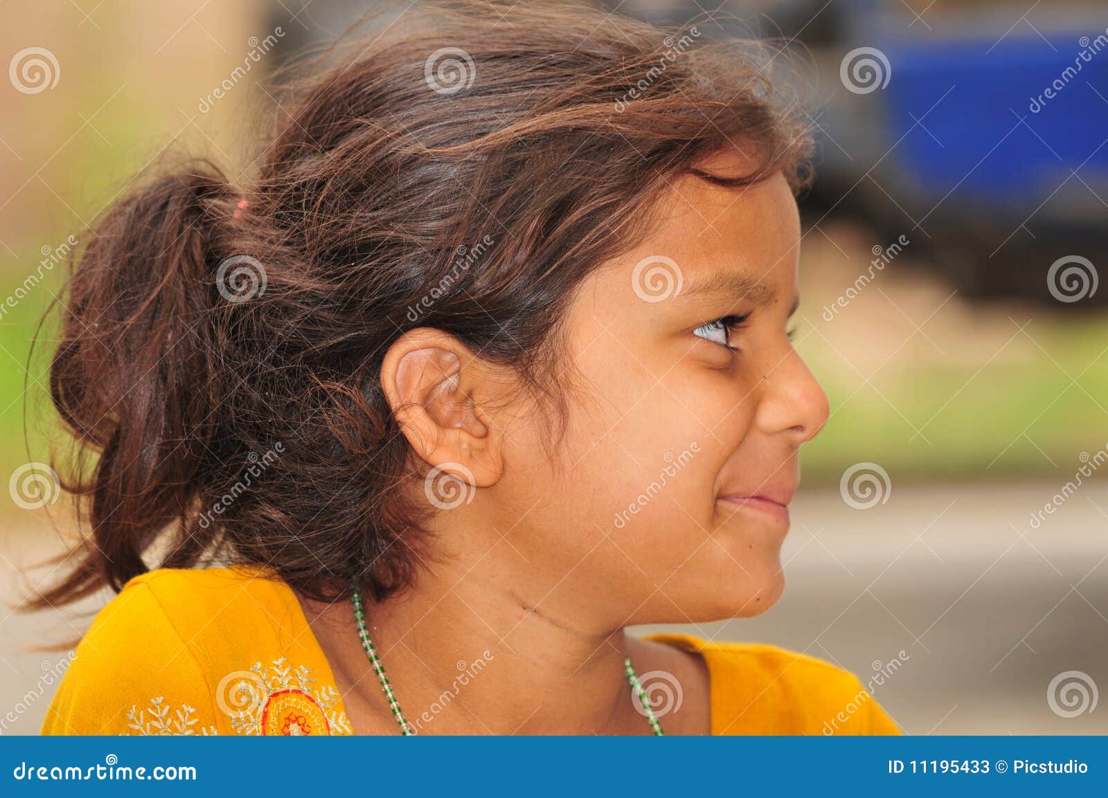 Sweet girl side pose stock image. Image of indian, laughing - 11195433