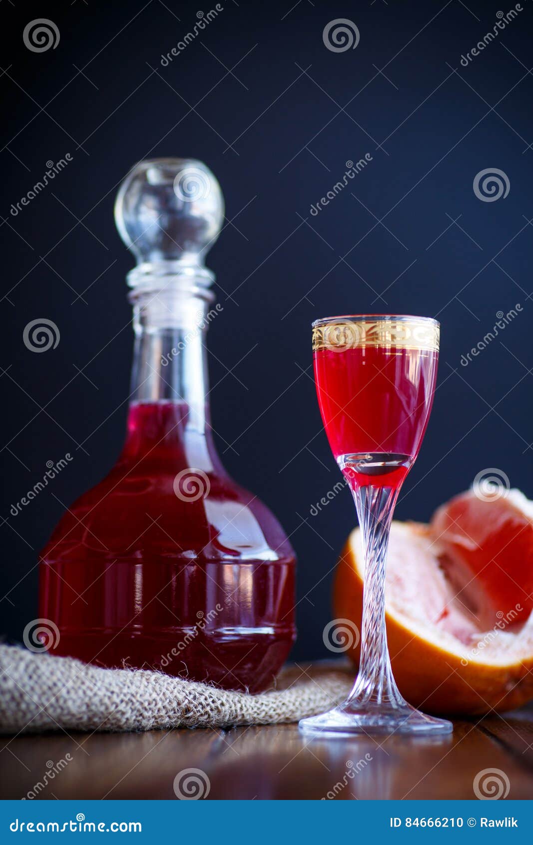 Sweet Grapefruit Alcoholic Cordial in the Decanter with a Glass Stock ...