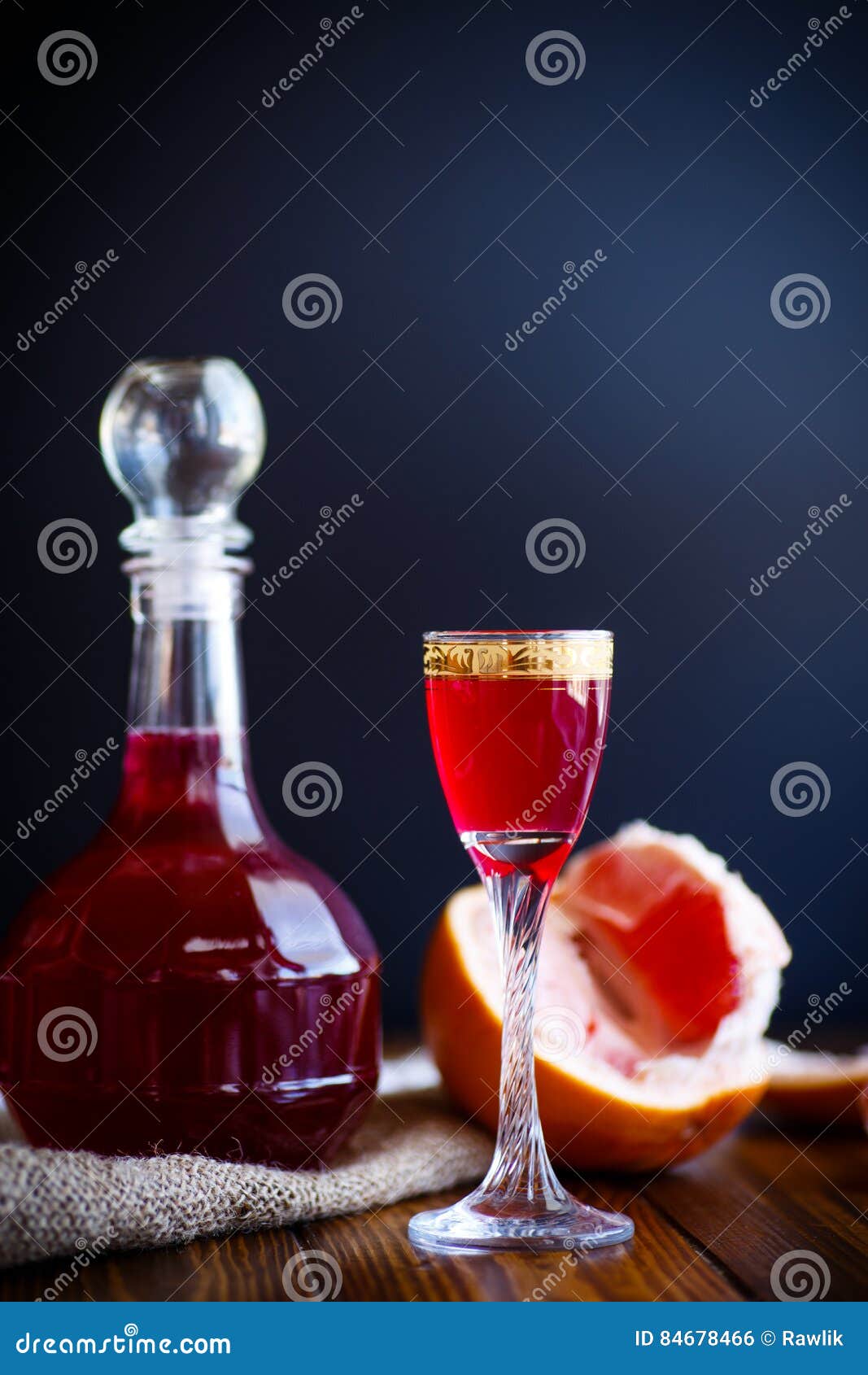 Sweet Grapefruit Alcoholic Cordial in the Decanter with a Glass Stock ...