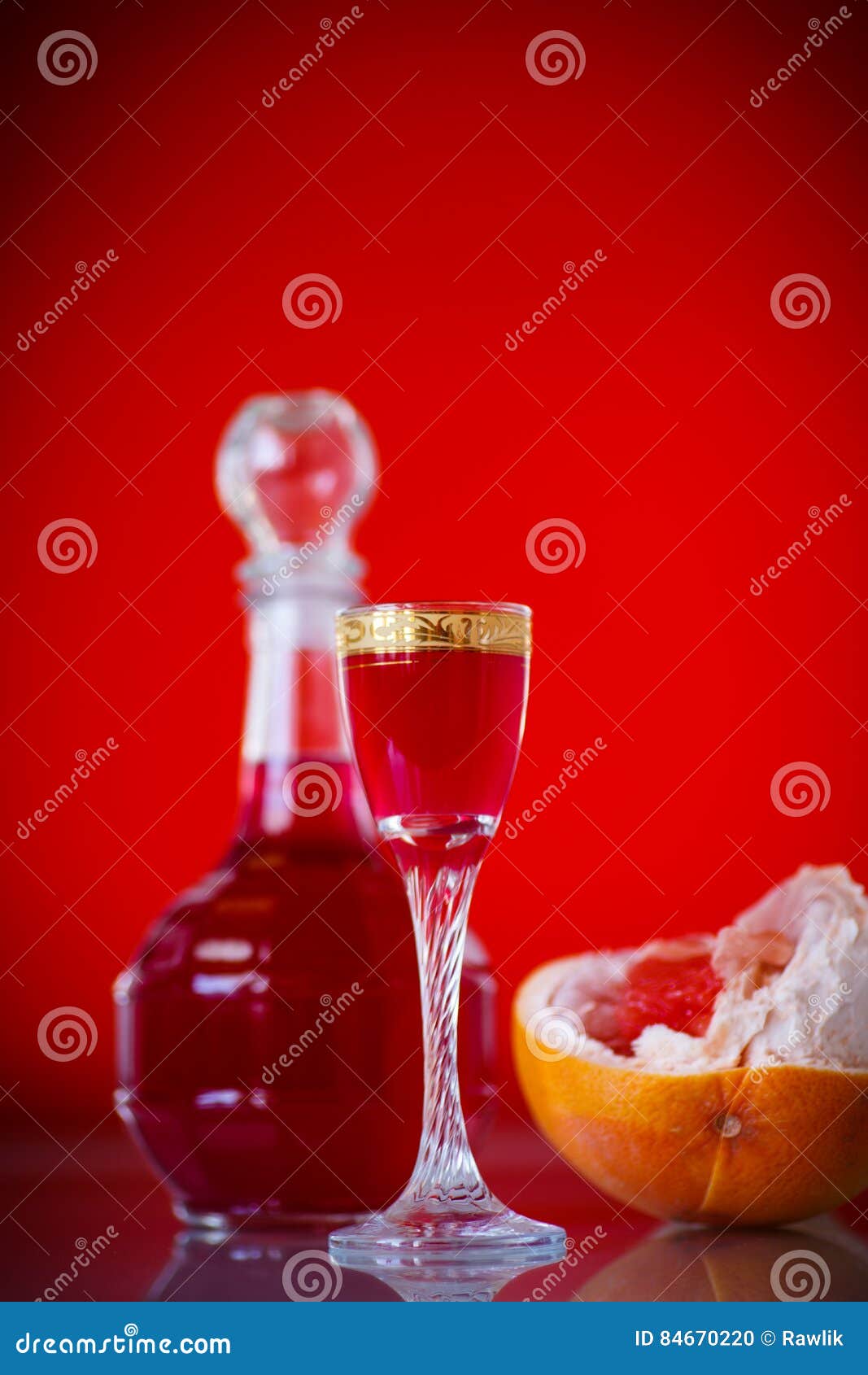 Sweet Grapefruit Alcoholic Cordial in the Decanter with a Glass Stock ...