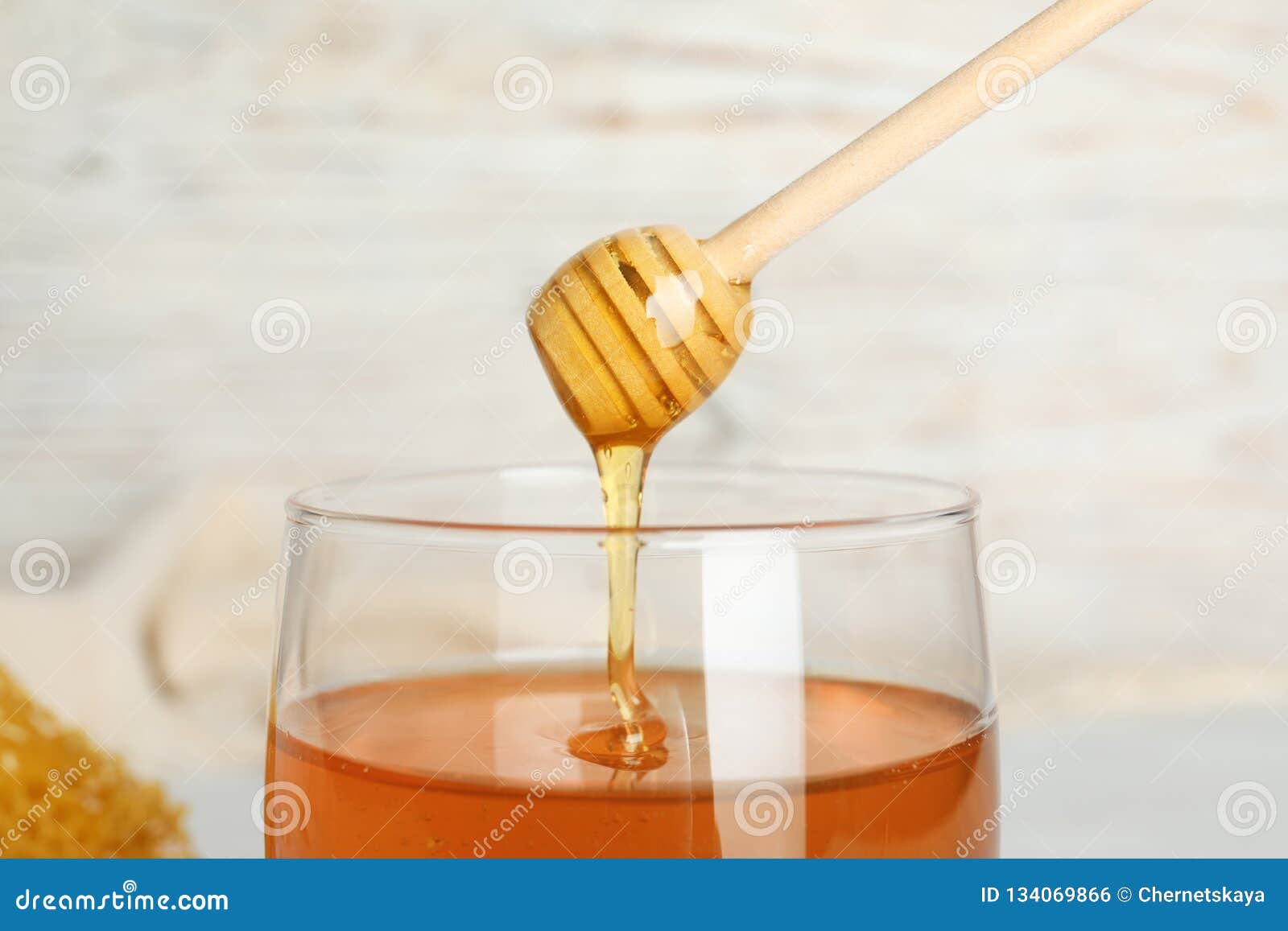 Sweet Honey Dripping from Dipper into Jar Stock Photo - Image of ...
