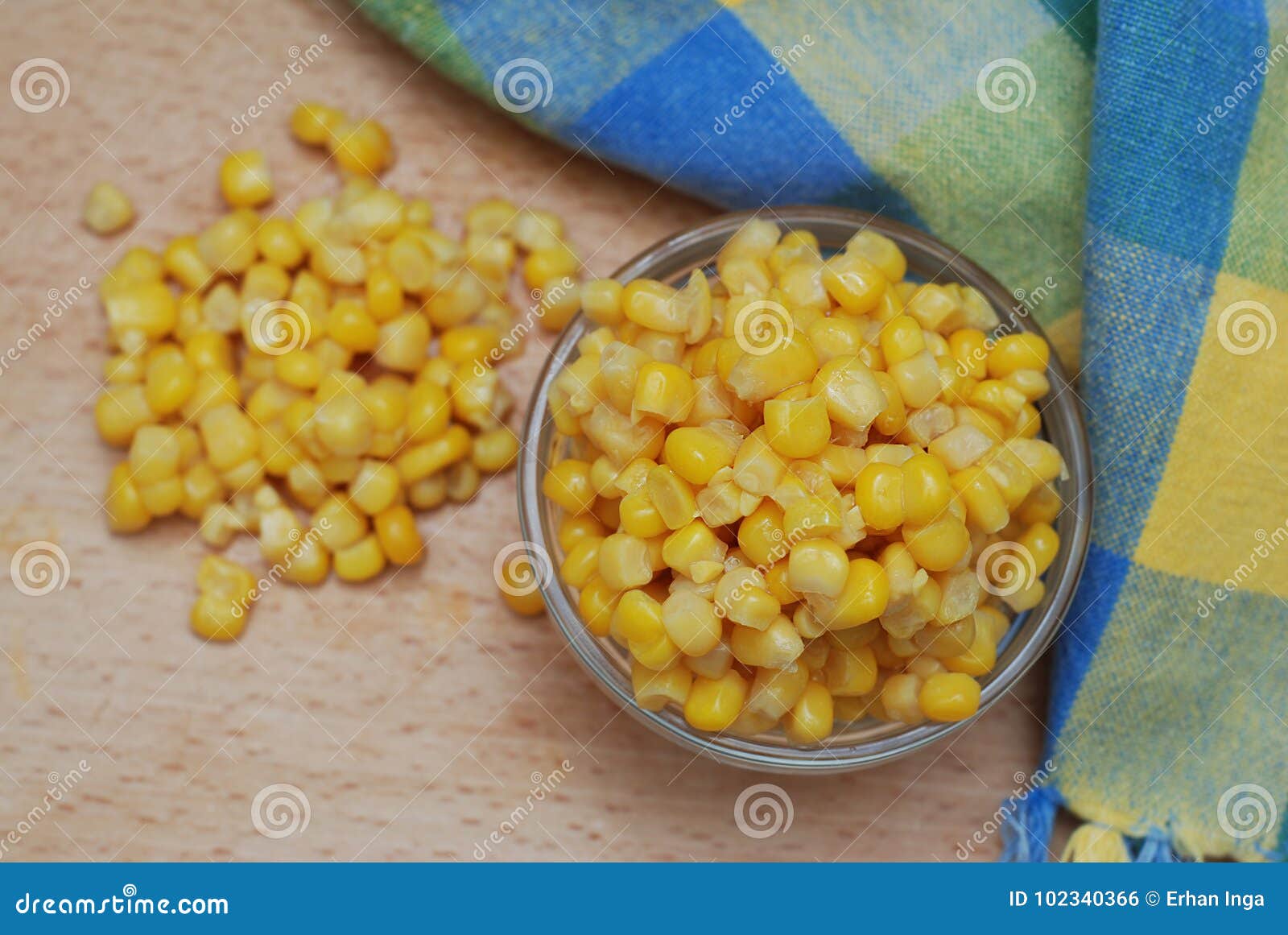 Sweet Kernel Corn in Glass Bowl with Blue Napkin Stock Photo - Image of ...
