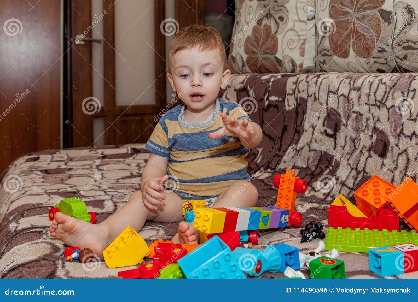 Sweet Little Boy Building Tower from Cubes at Home Stock Photo - Image ...