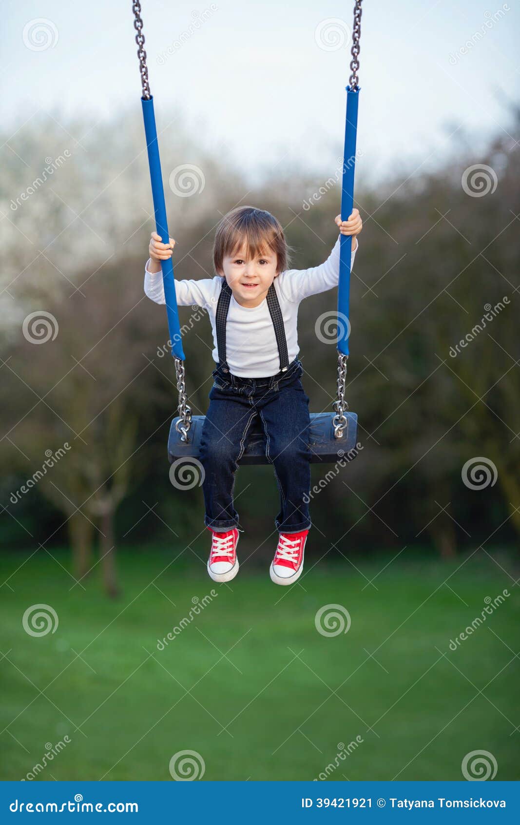 Sweet Little Boy, Swinging in a Park Stock Image - Image of excited ...
