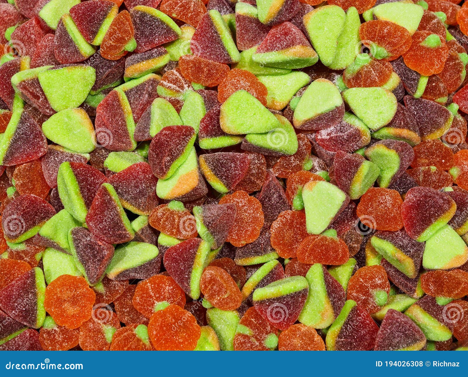 Sweet Marmalade of Different Colors Sprinkled with Sugar Stock Photo ...