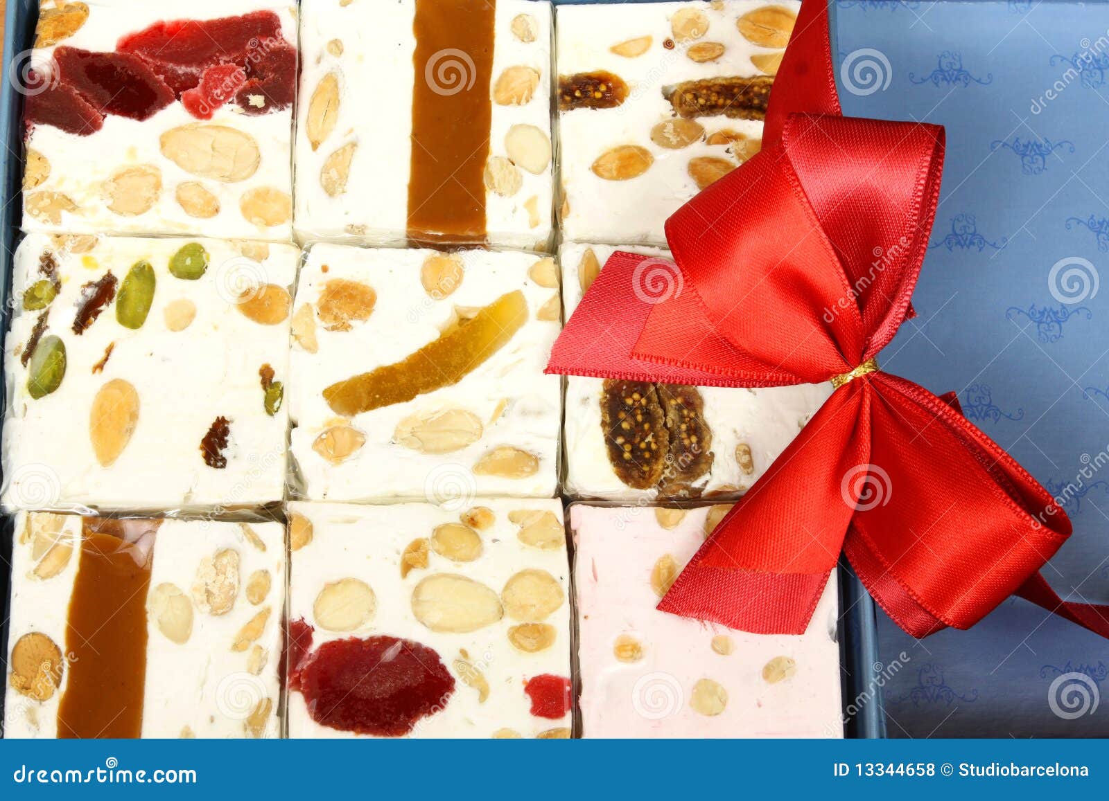 Sweet nougat bars in box stock photo. Image of dried - 13344658