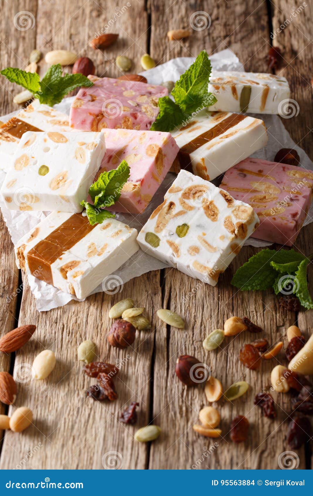 Sweet Nougat with Nuts, Decorated with Mint Closeup on the Paper Stock ...