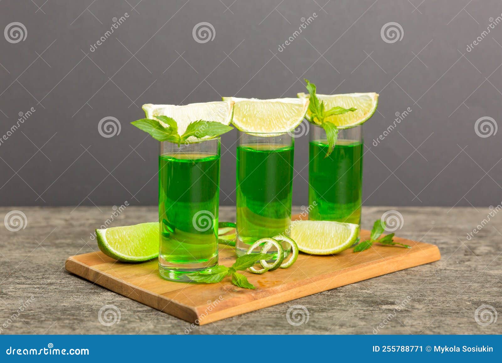 Sweet Refreshing Mint Liqueur, with Ice and Mint Leaves on Table ...