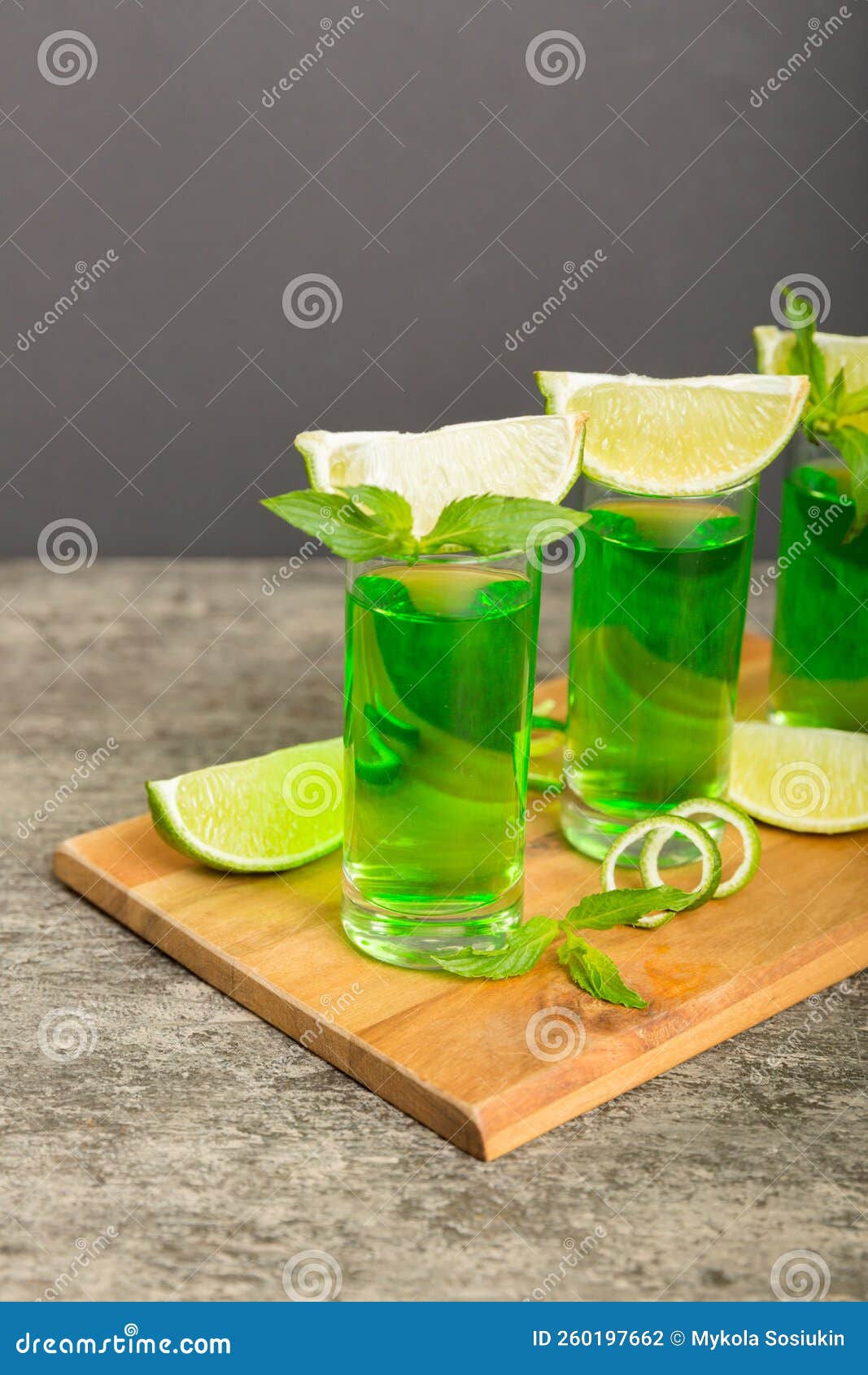 Sweet Refreshing Mint Liqueur, with Ice and Mint Leaves on Table ...