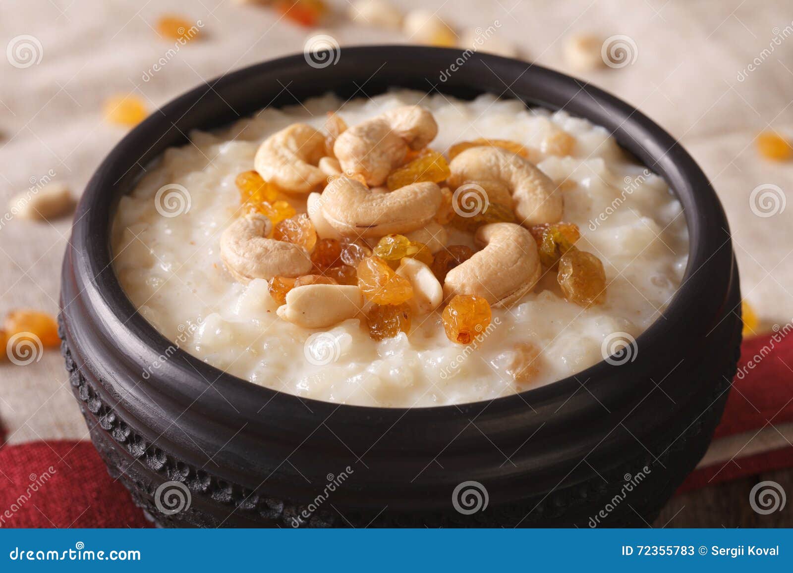 Sweet Rice Pudding with Nuts and Raisins in a Bowl Close-up. Horizontal ...