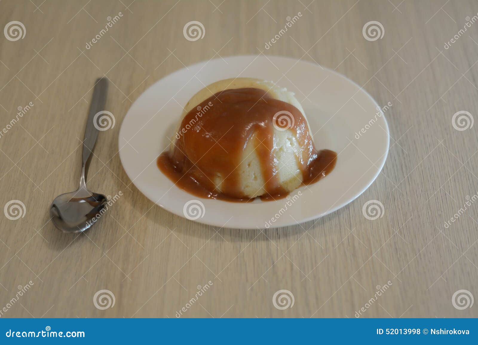 Sweet Rice Pudding on the Plate with Sweet Fruit Sauce Stock Photo ...